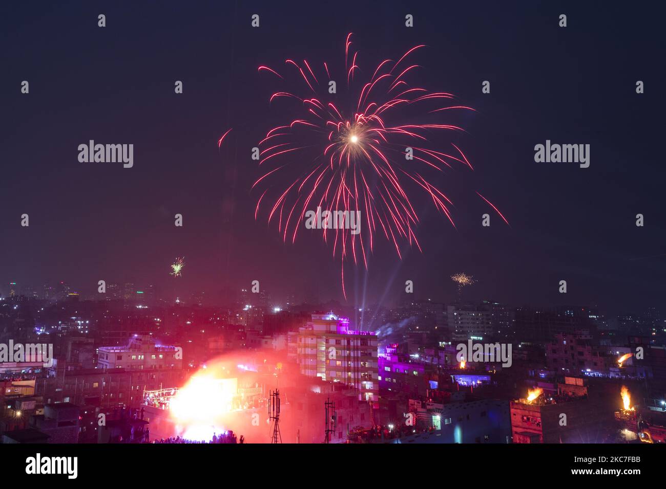 Youth celebrate with fireworks and lights during the Shakrain festival ...