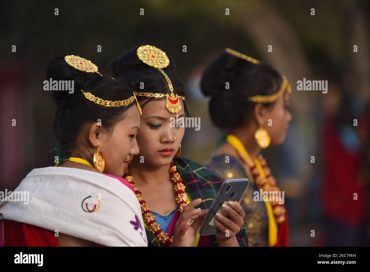 Nepalese Magar community girls in a traditional attire taking selfie ...