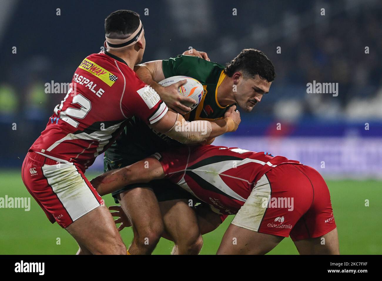 Nathan Cleary of Australia is tackled by Charbel Tasipale and Khaled ...