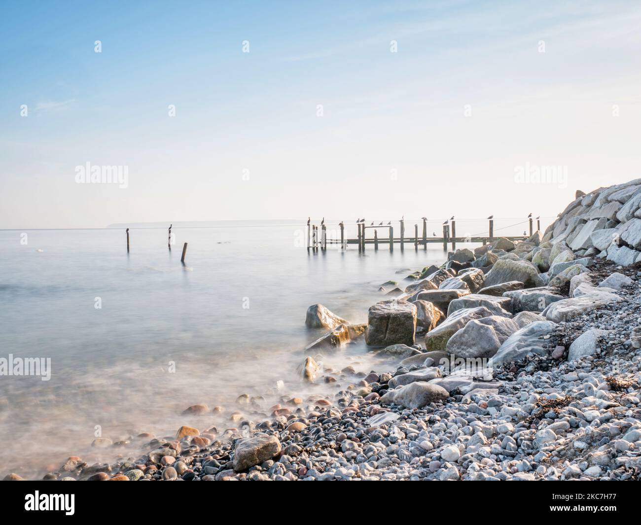 The rest of pillars and poles of port mole in fishing Village of Vitt ...