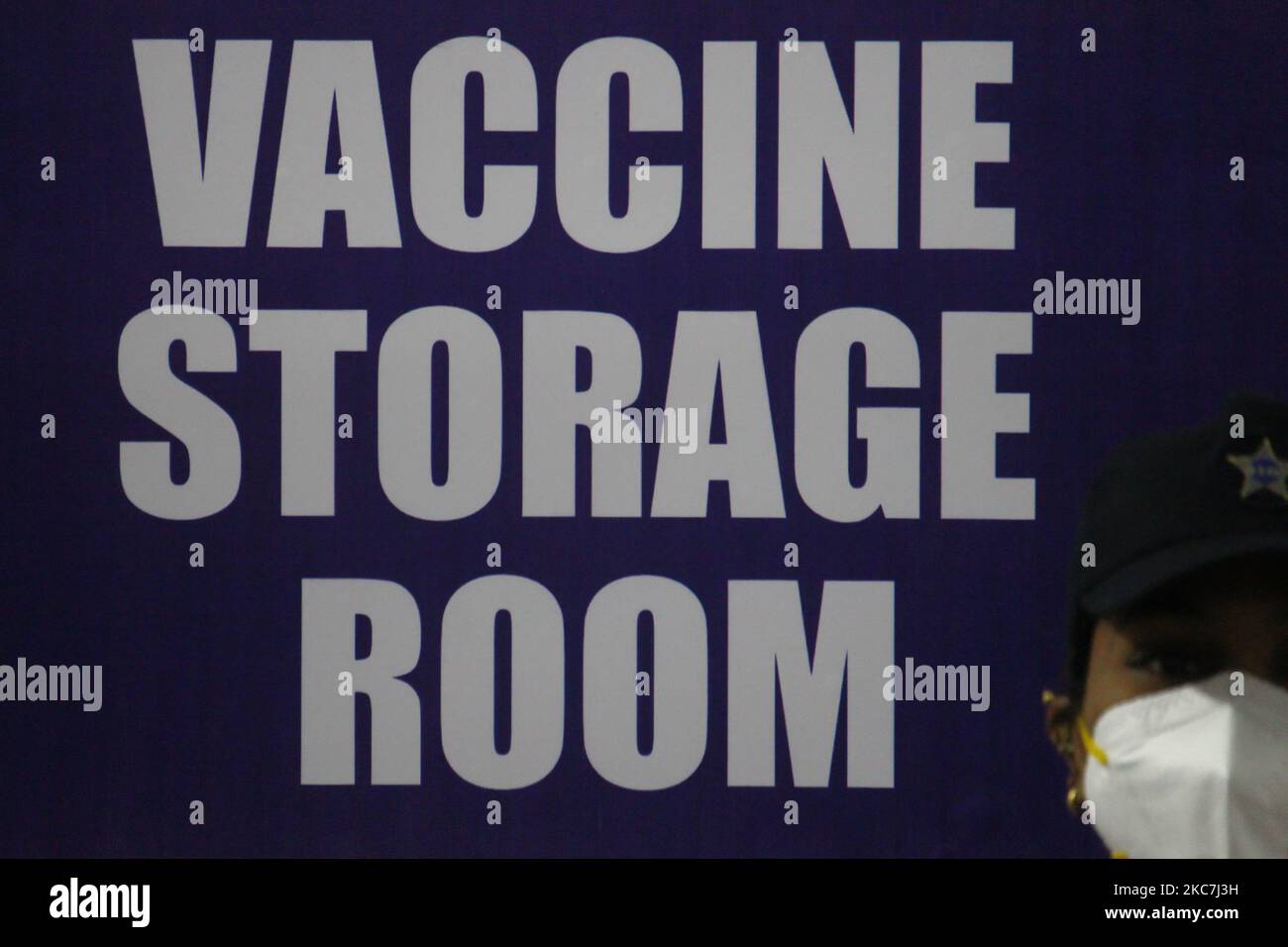 A security personnel stands guard outside a Covid-19 vaccine storage ...