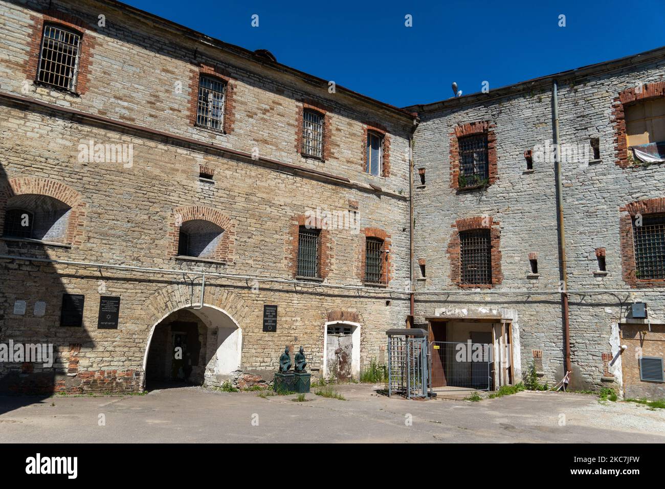 A brick building of the Patarei Prison against the blue sky in Tallinn ...