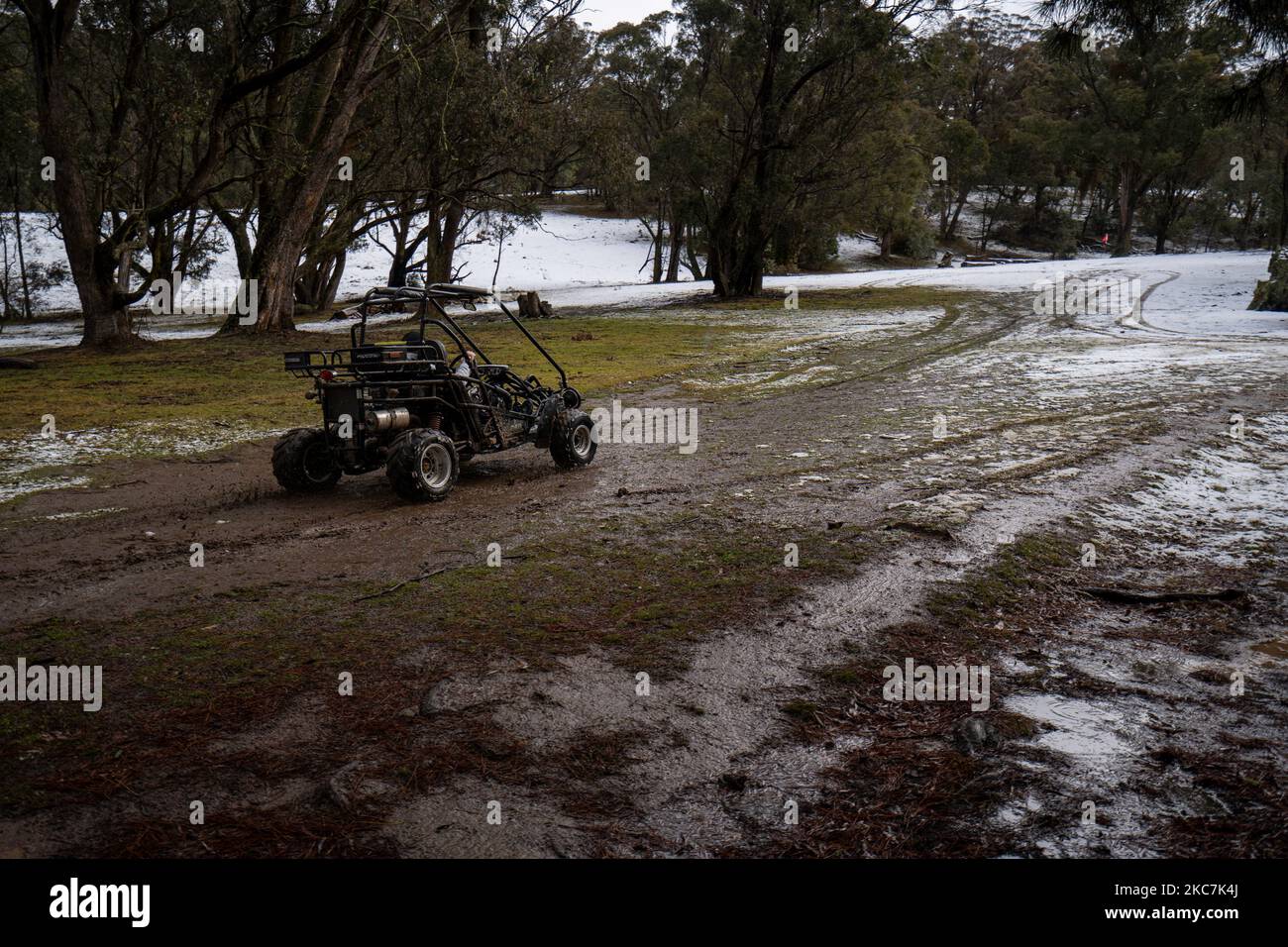 A Dune Buggy being driven in the snow fields of a farm in outback ...