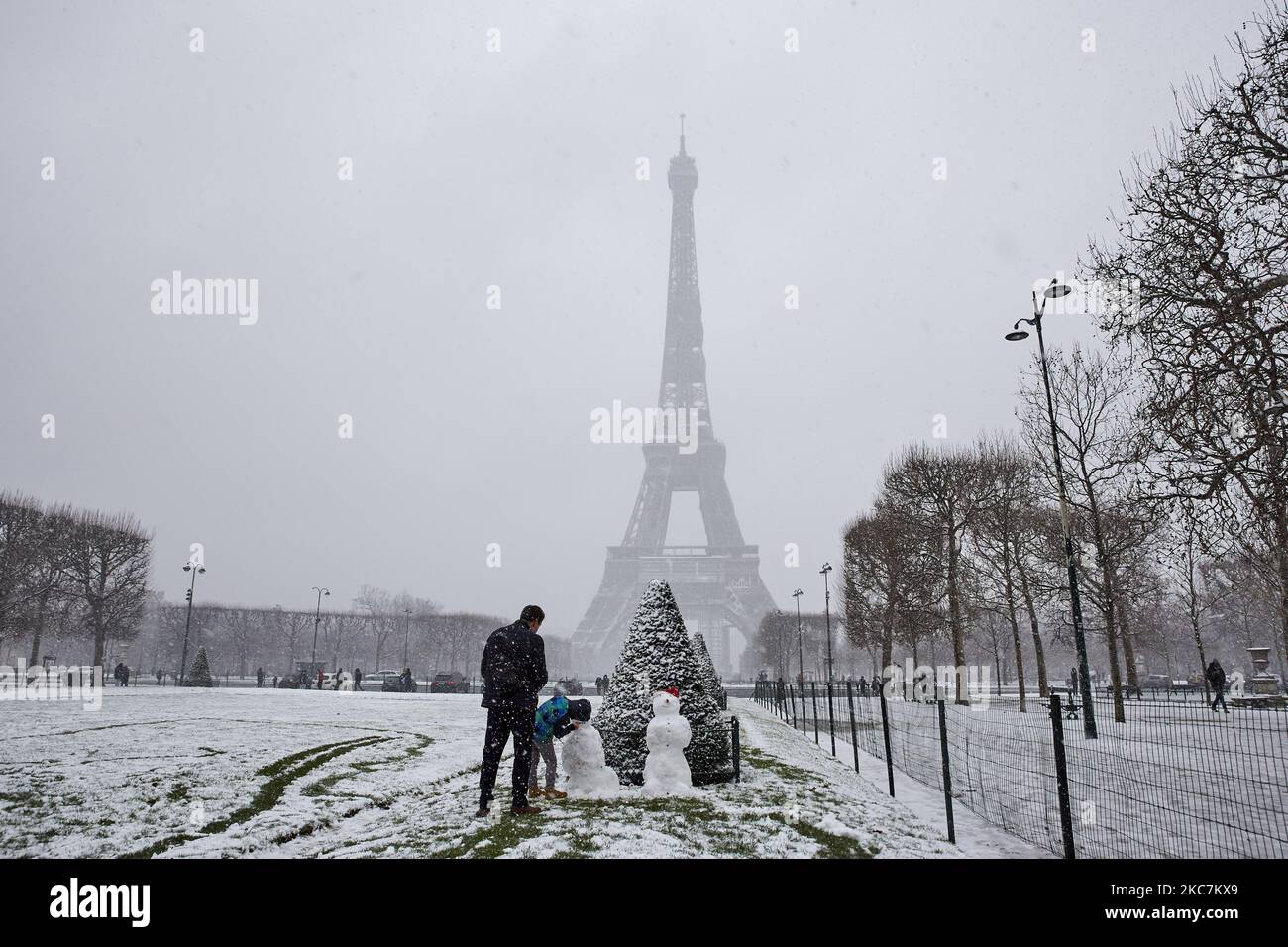 People walk in Paris, France, on January 16, 2021 during the first ...