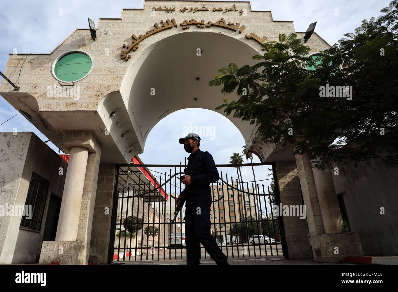 Members of the Hamas security forces stand guard outside the ...