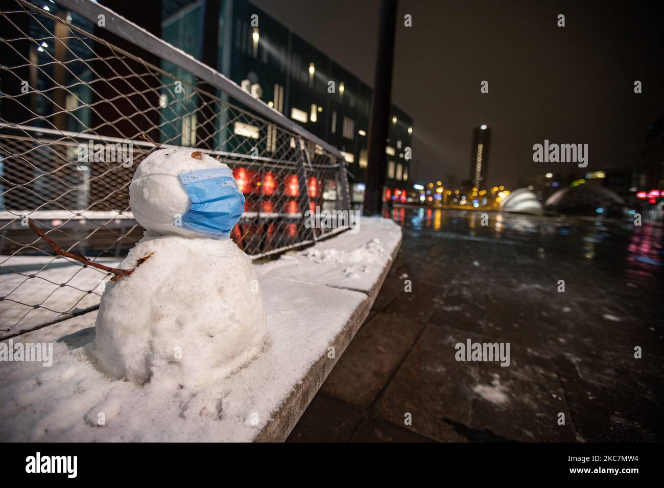 A COVID-19 compliant snowman with a medical facemask as seen in the ...