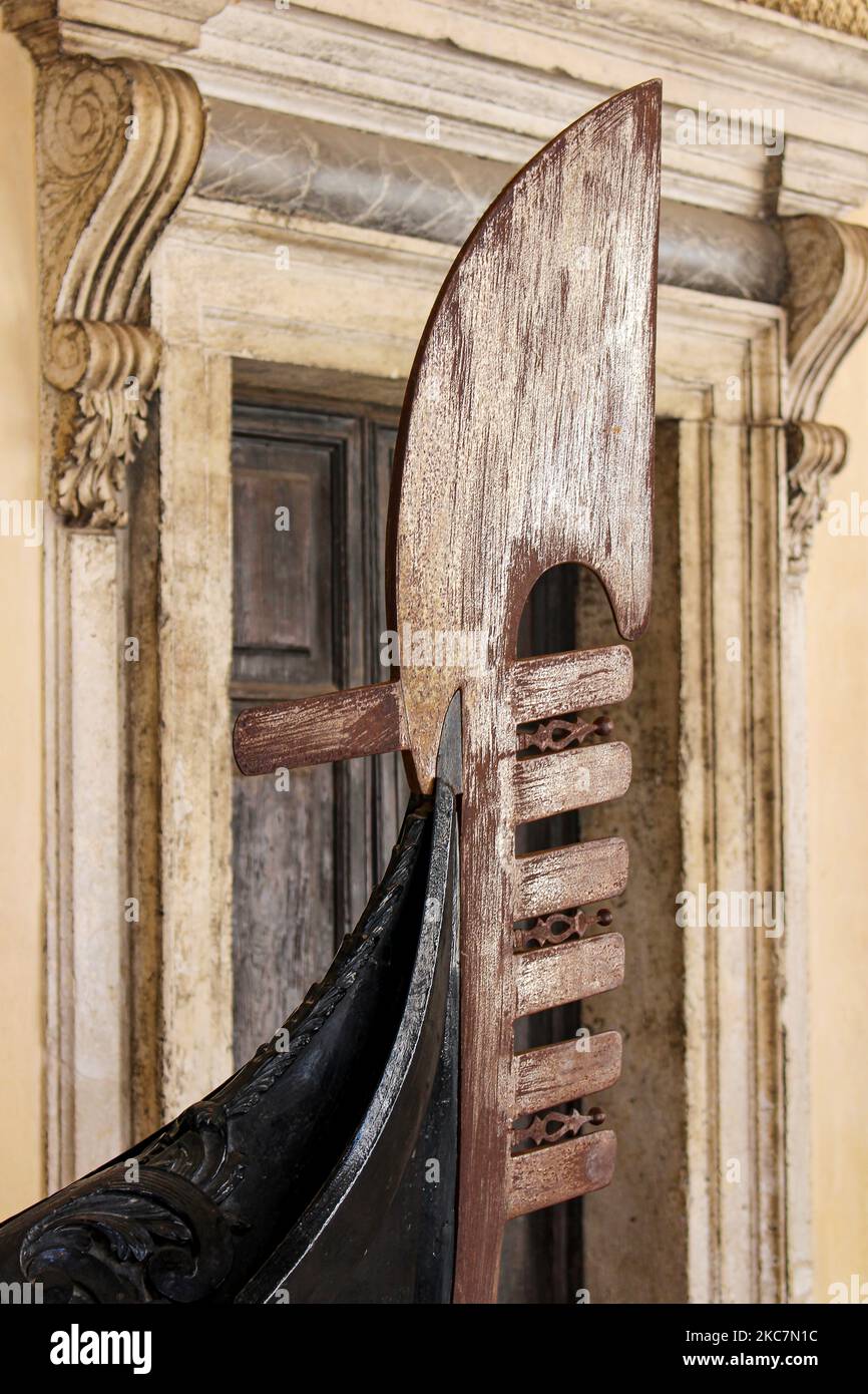 A vertical closeup of a carved wooden boat figurehead decoration for ...