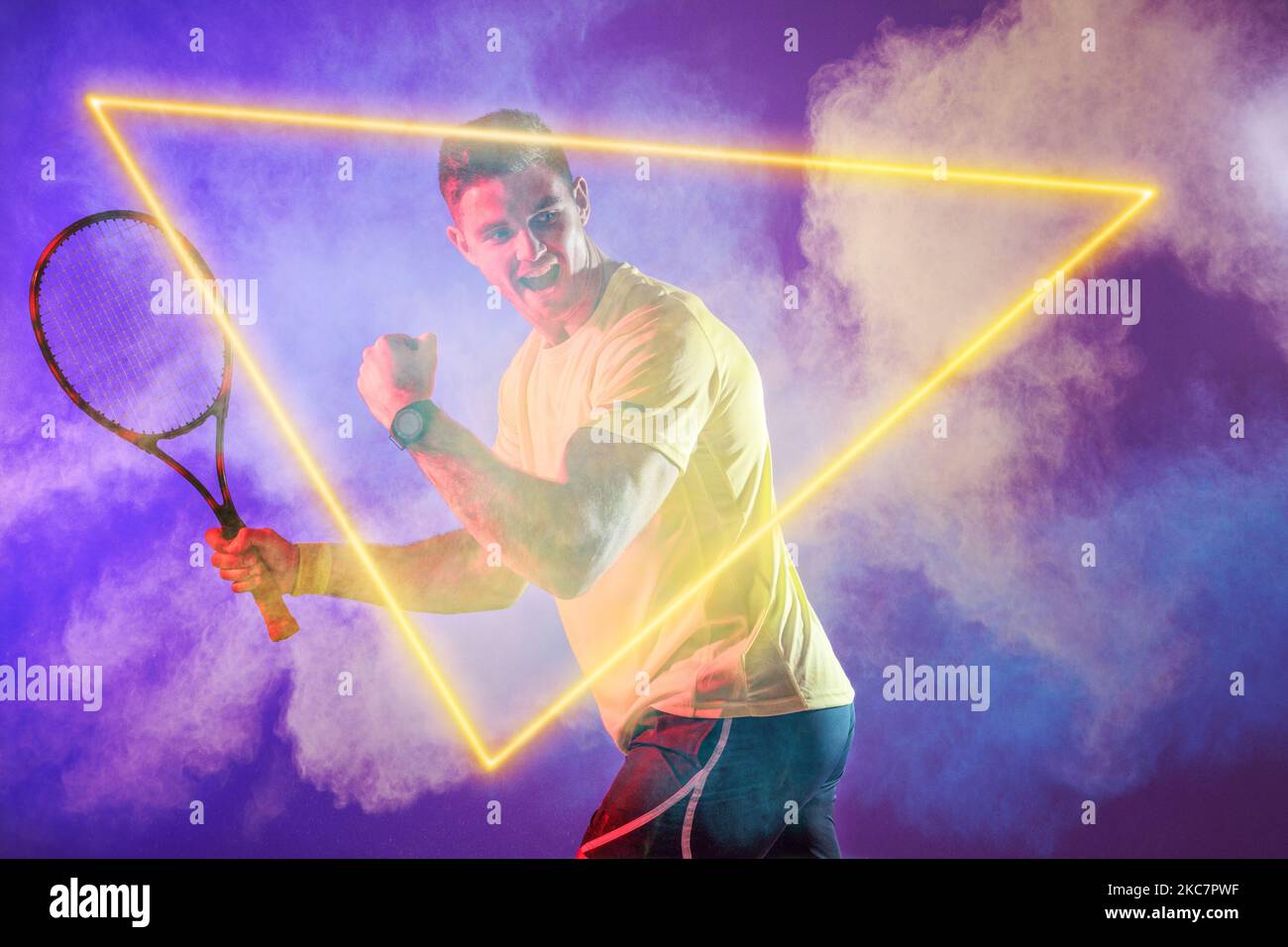Caucasian male tennis player holding racket and screaming by ...