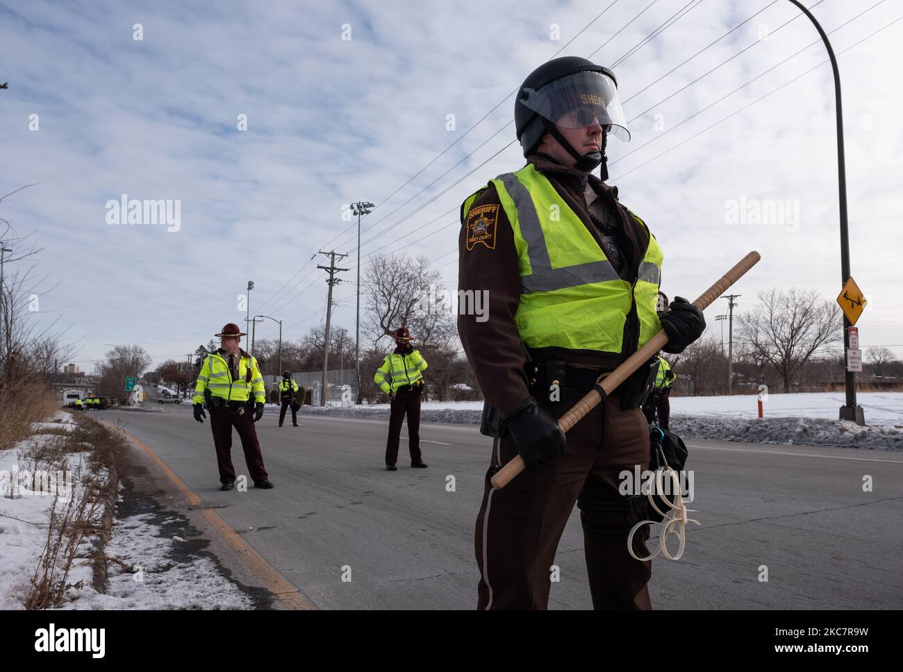 State Patrol officers stand in front of a freeway exit in St. Paul to ...
