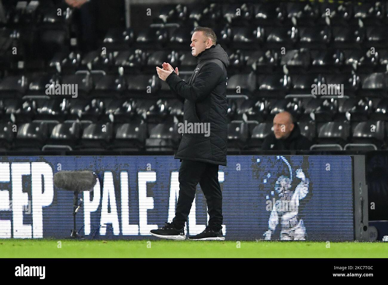 Wayne Rooney, manager of Derby County applauds his players during the ...
