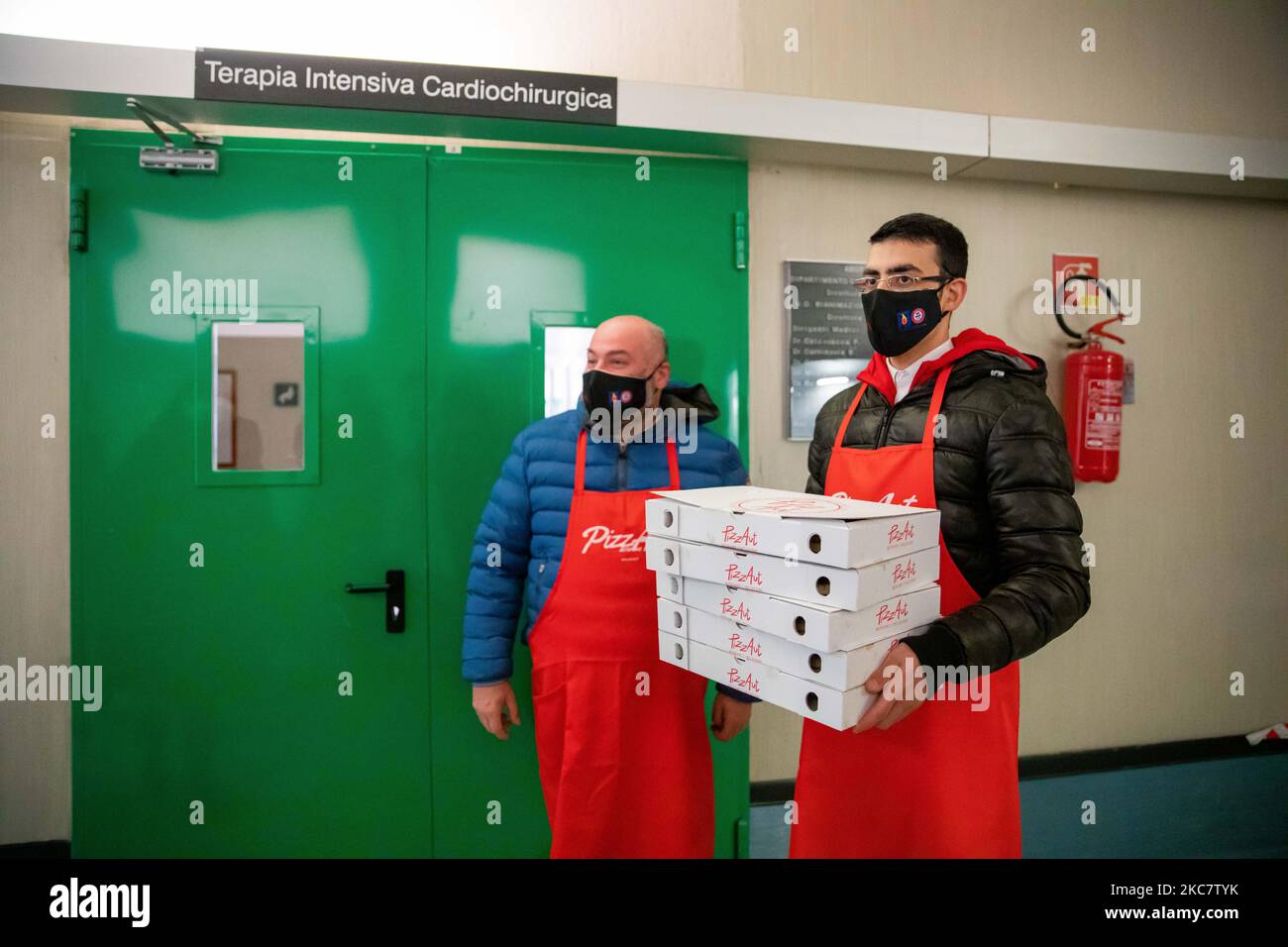 The staff of PizzAut, pizzeria run by autistic guys, prepares and ...