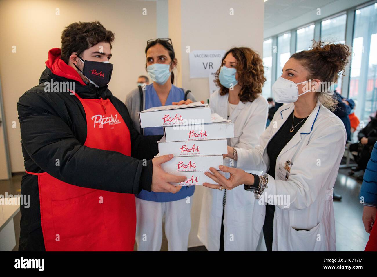 The staff of PizzAut, pizzeria run by autistic guys, prepares and ...