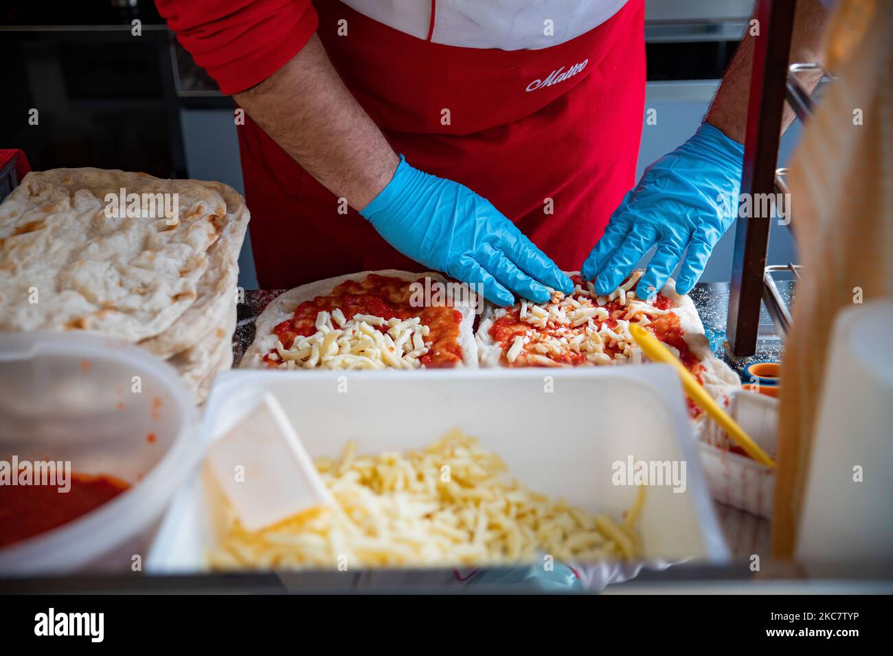 The staff of PizzAut, pizzeria run by autistic guys, prepares and ...