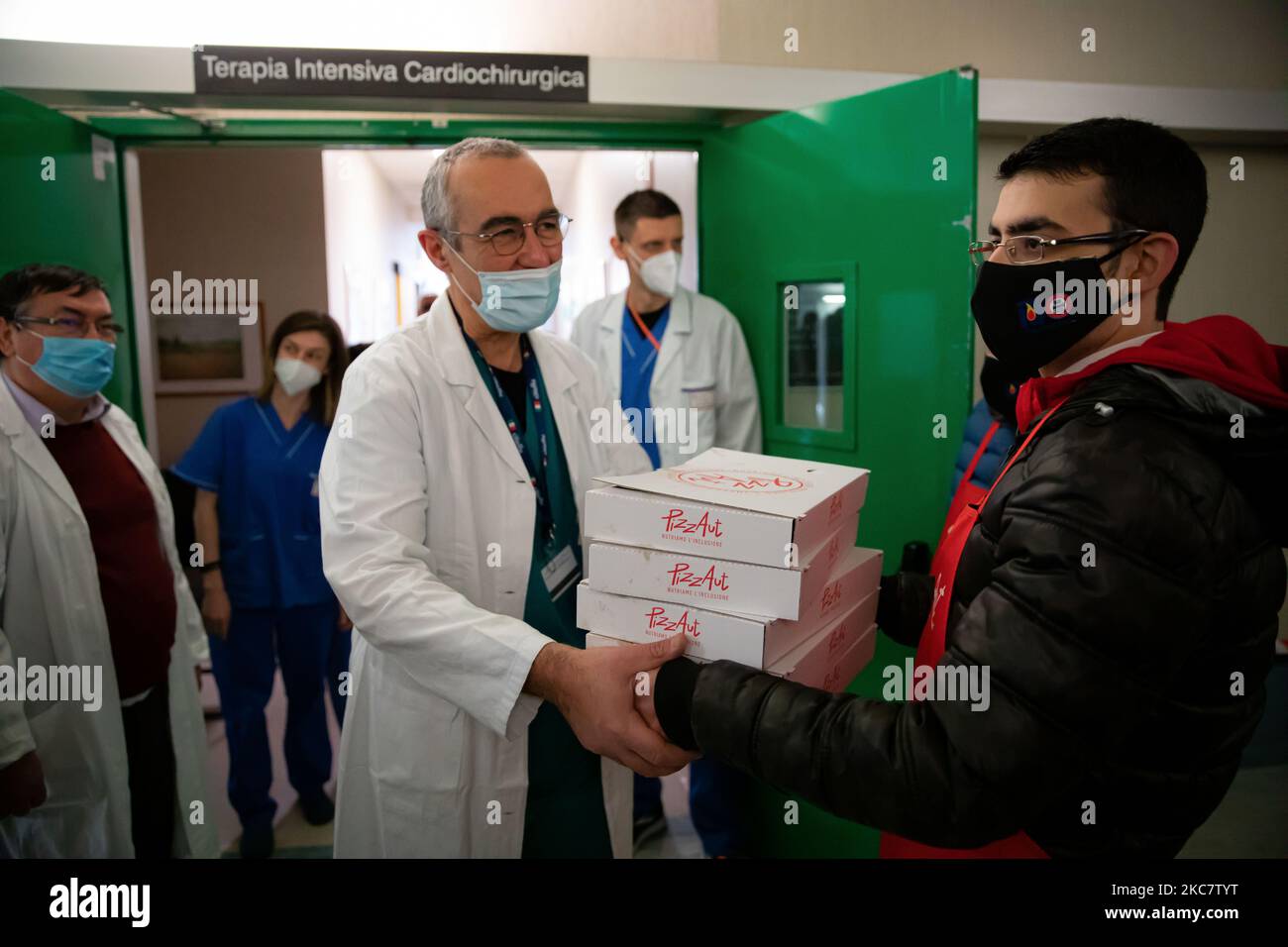 The staff of PizzAut, pizzeria run by autistic guys, prepares and ...