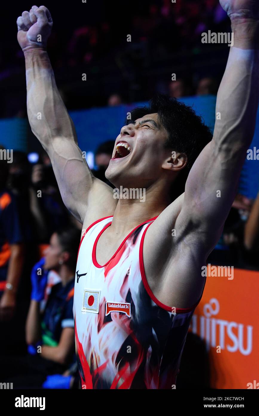Japan's Daiki Hashimoto reacts after competing on the high bar during ...