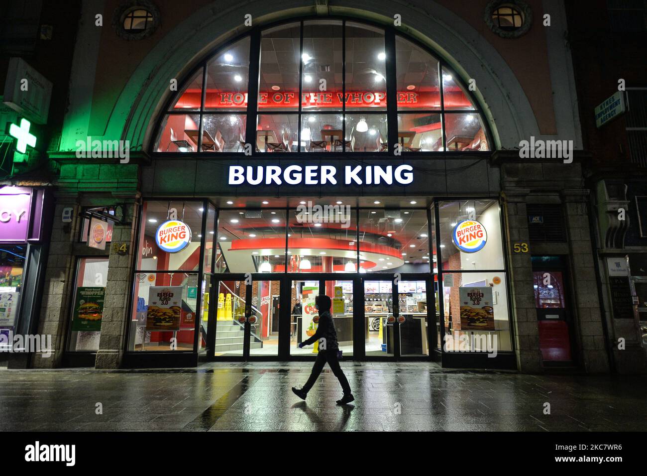 A person walks by Burger King fast food restaurant in O'Connell Street ...