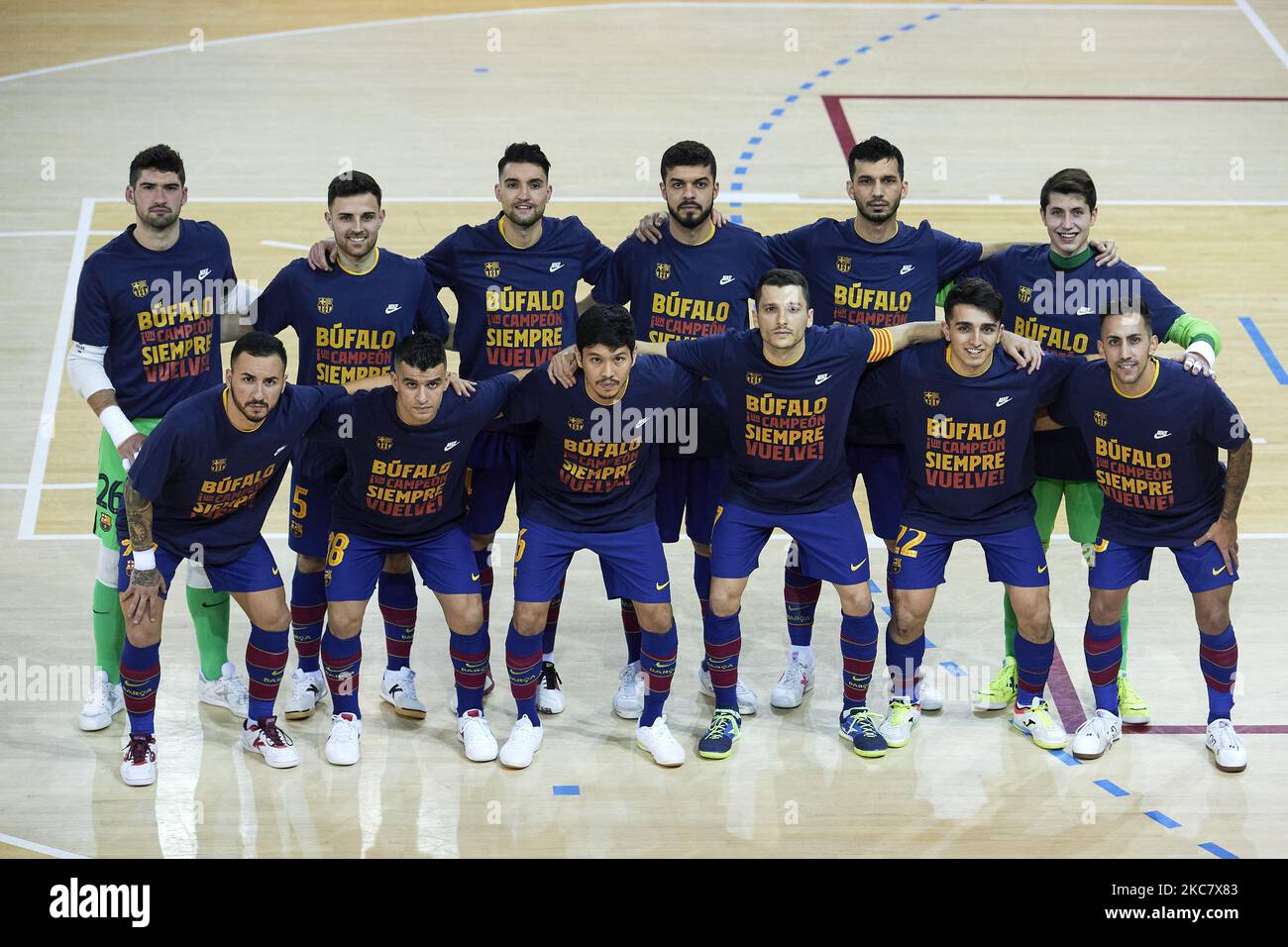 FC Barcelona players pose with a support T-shirt for captain Sergio ...
