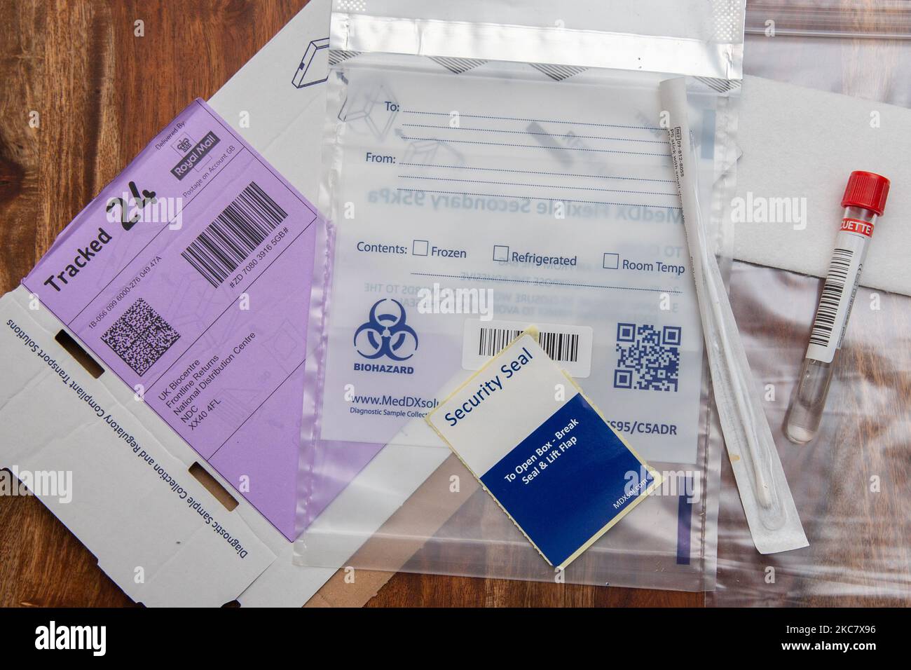 Home testing kit, including the safe packaging, tube with preservative ...