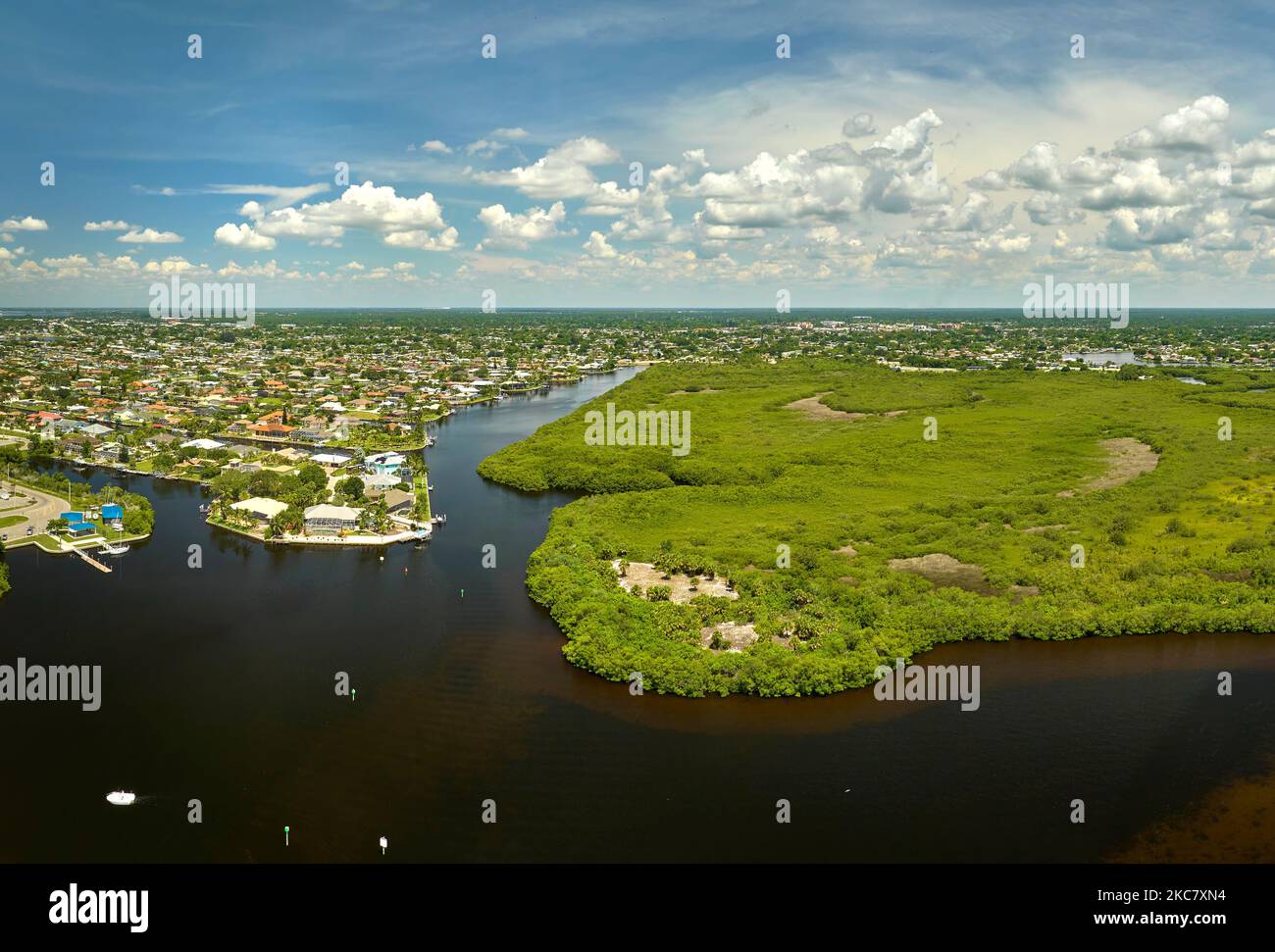 Aerial view of rural private houses in remote suburbs located near ...