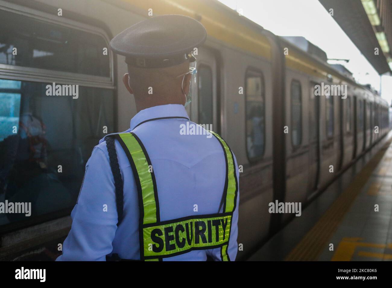 Security guard of LRT-2 in Santolan Station, Pasig City wearing face ...