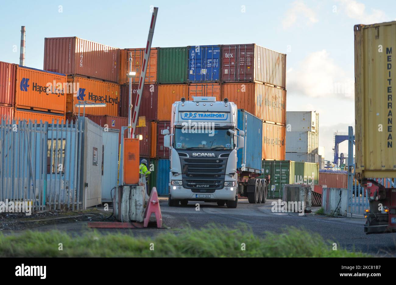 A freight lorry leaves the container depot in Dublin Port. On Friday ...