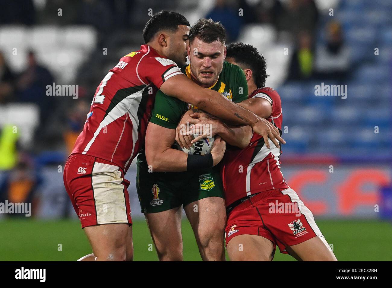 Angus Crichton of Australia is tackled by Elie El-Zakhem and Brandon ...