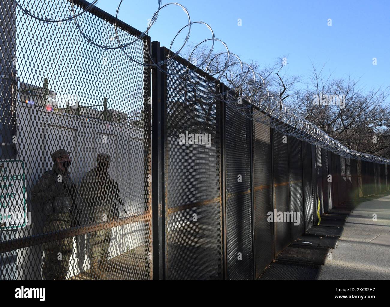 National Guard soldiers armed with M4 rifles protect the U.S Capitol ...