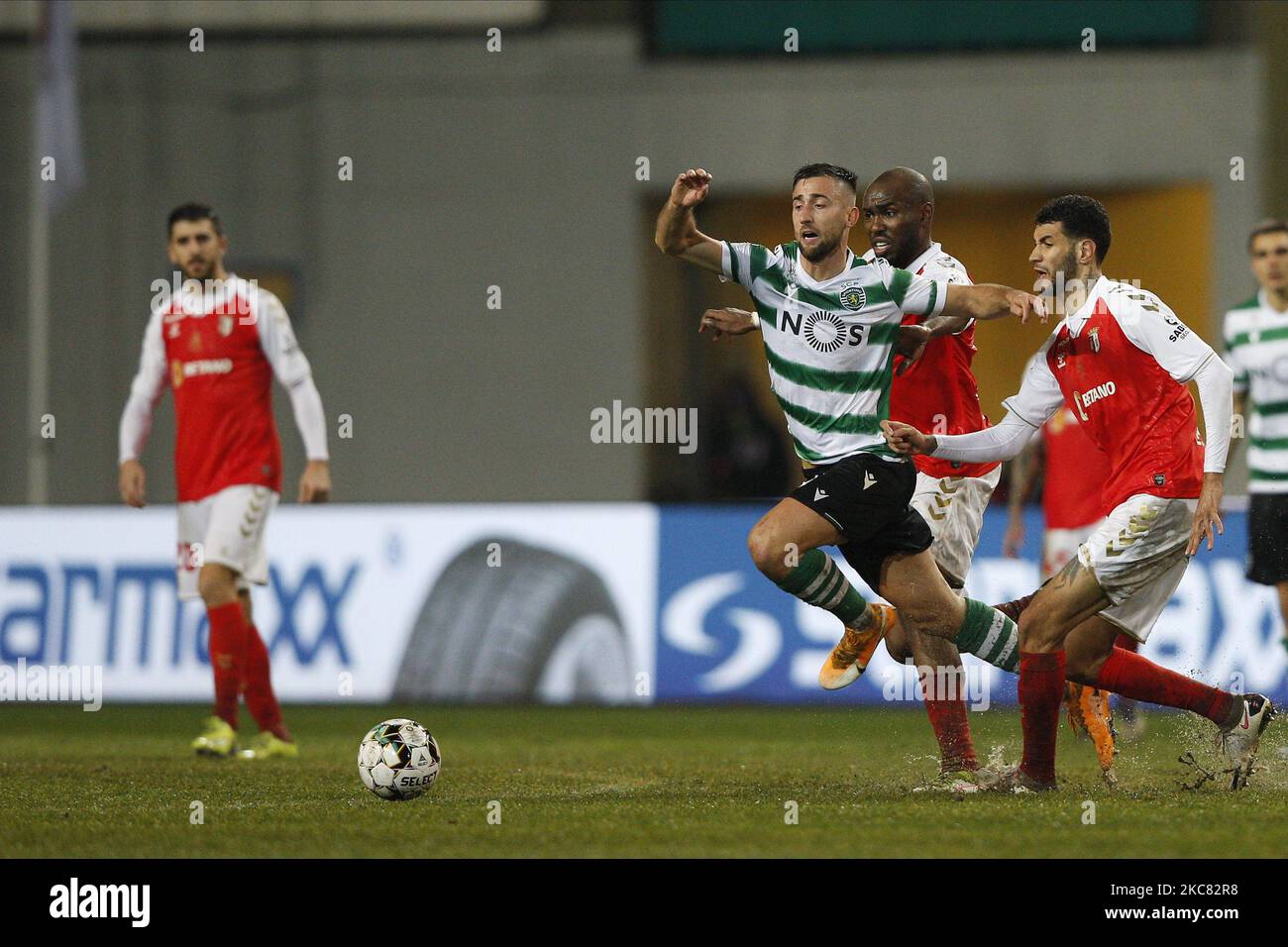 Andraz Sporar slips between two adversaries during the Allianz Cup ...