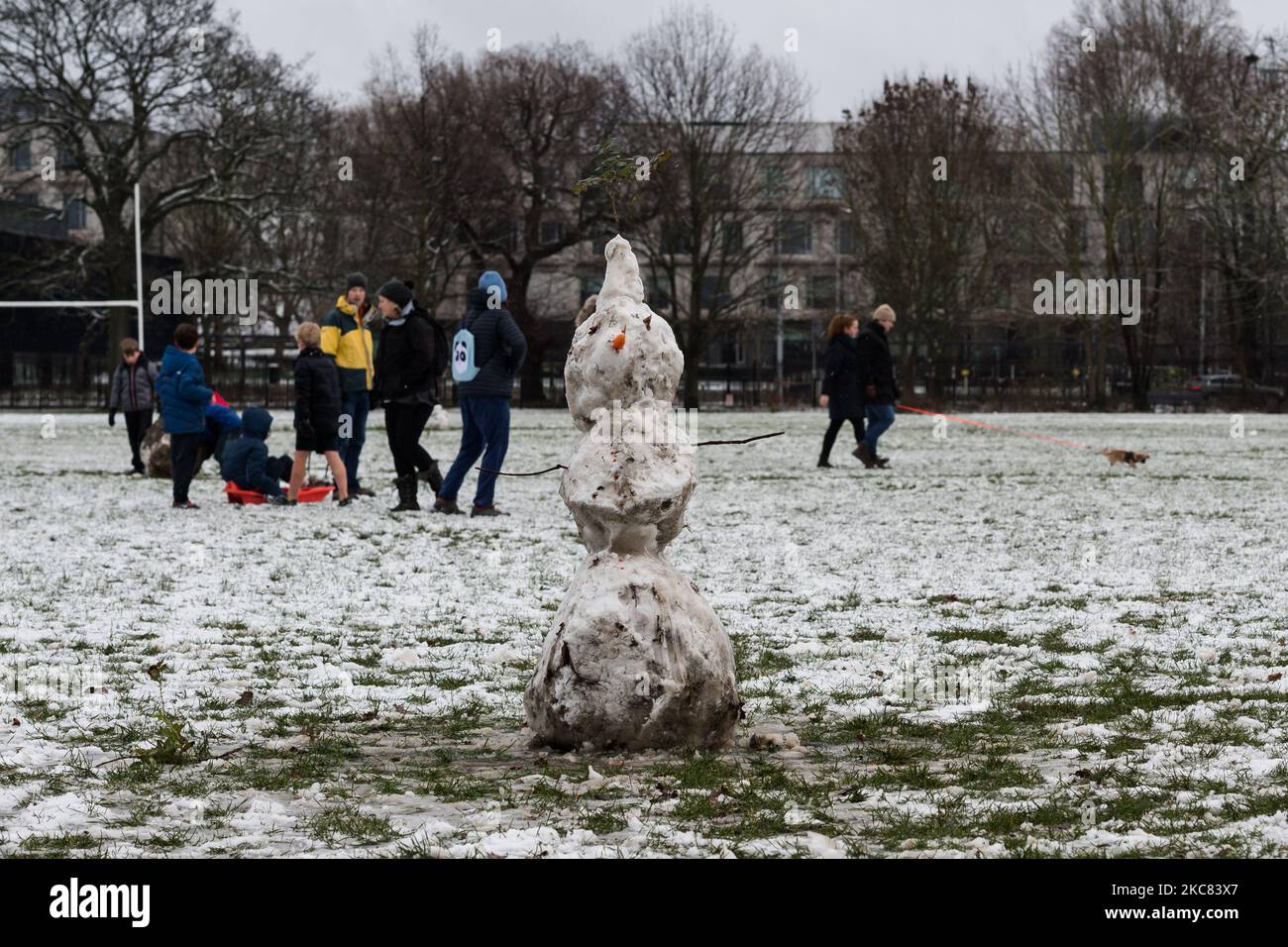 A snowman is pictured in a park in Wandsworth in south west London, on ...
