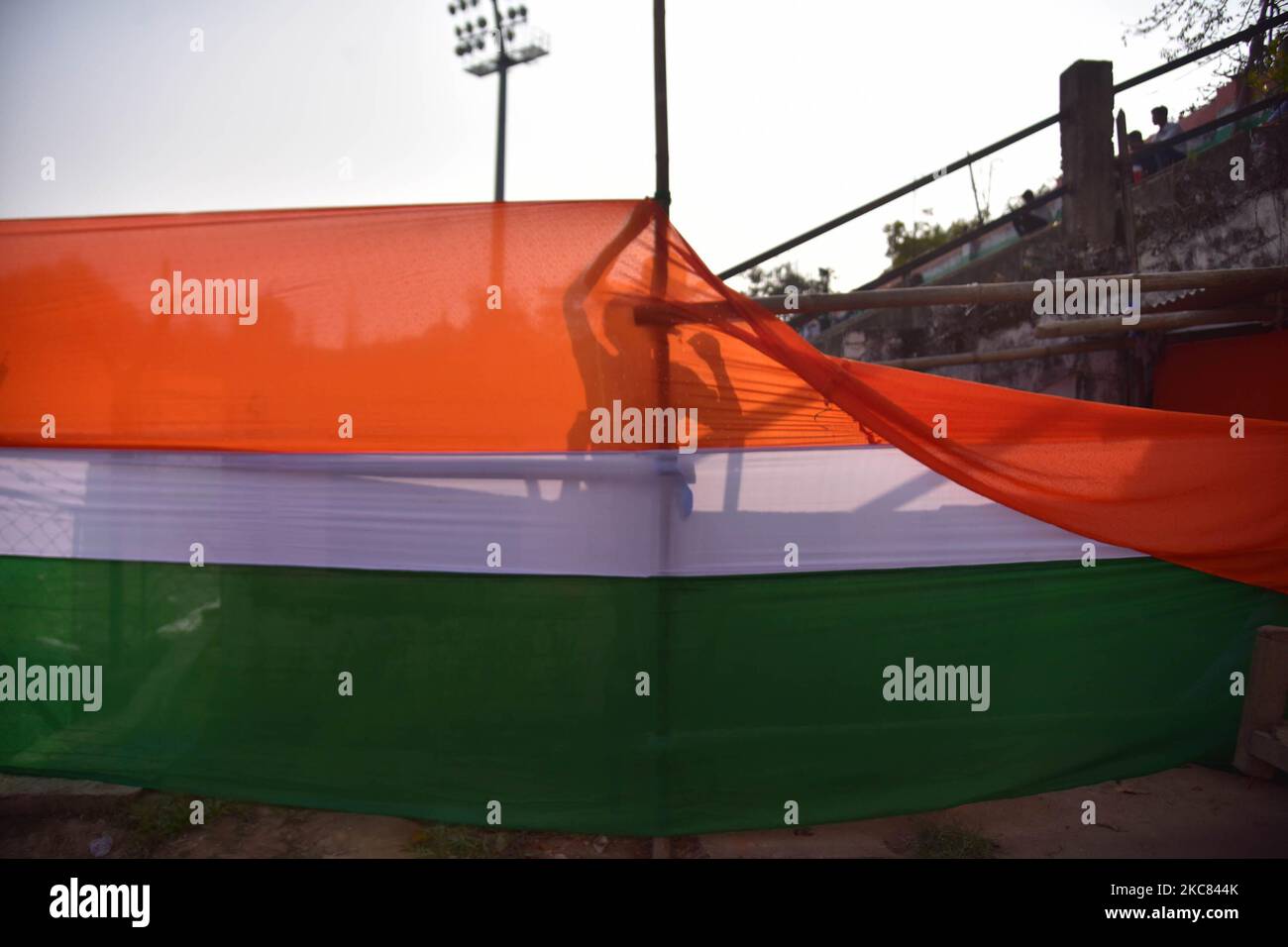 workers decorate the venue of the parade ground in colors of the ...