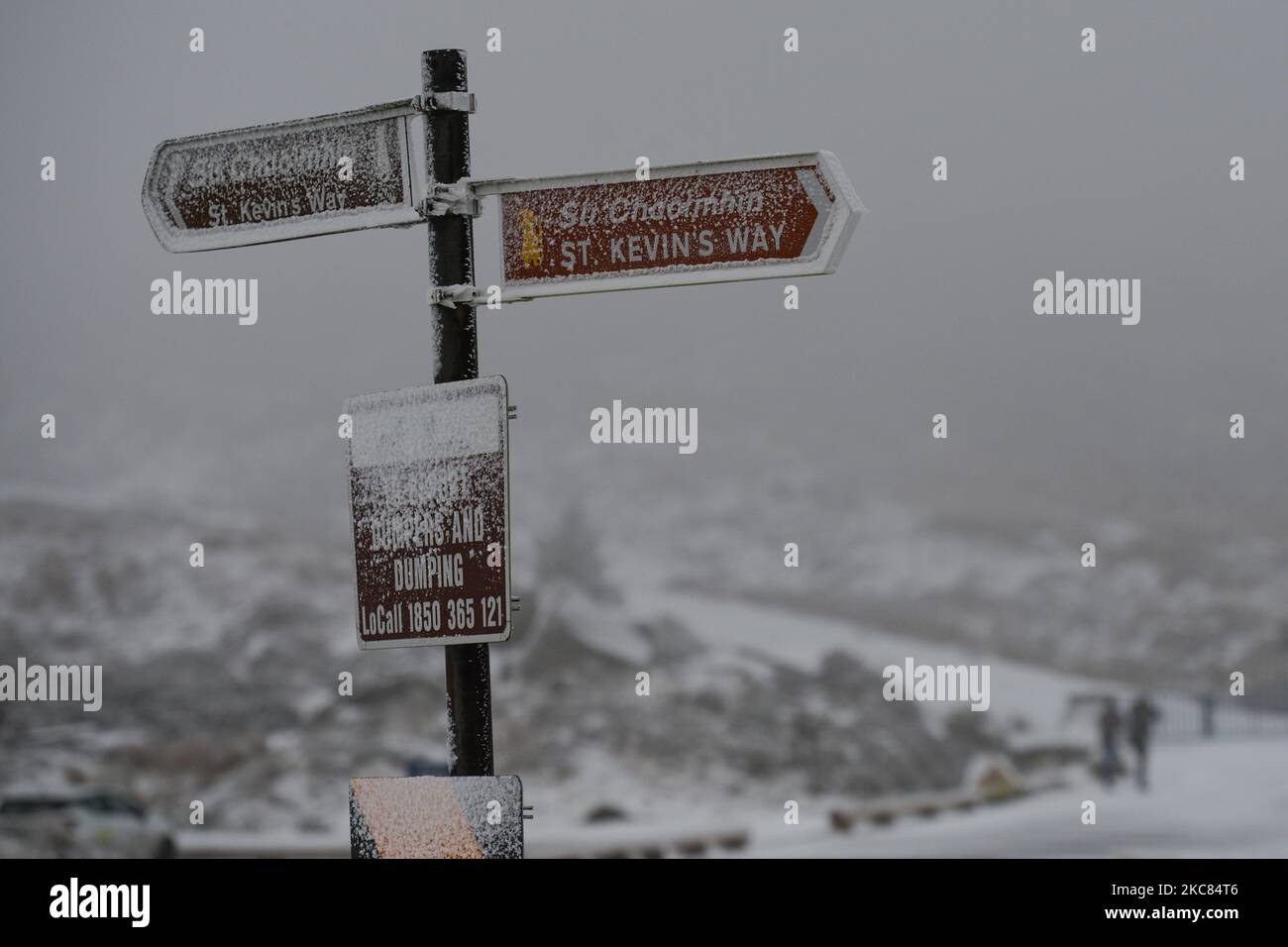 Road signs partially covered with snow at Wicklow Gap, Co. Wicklow ...