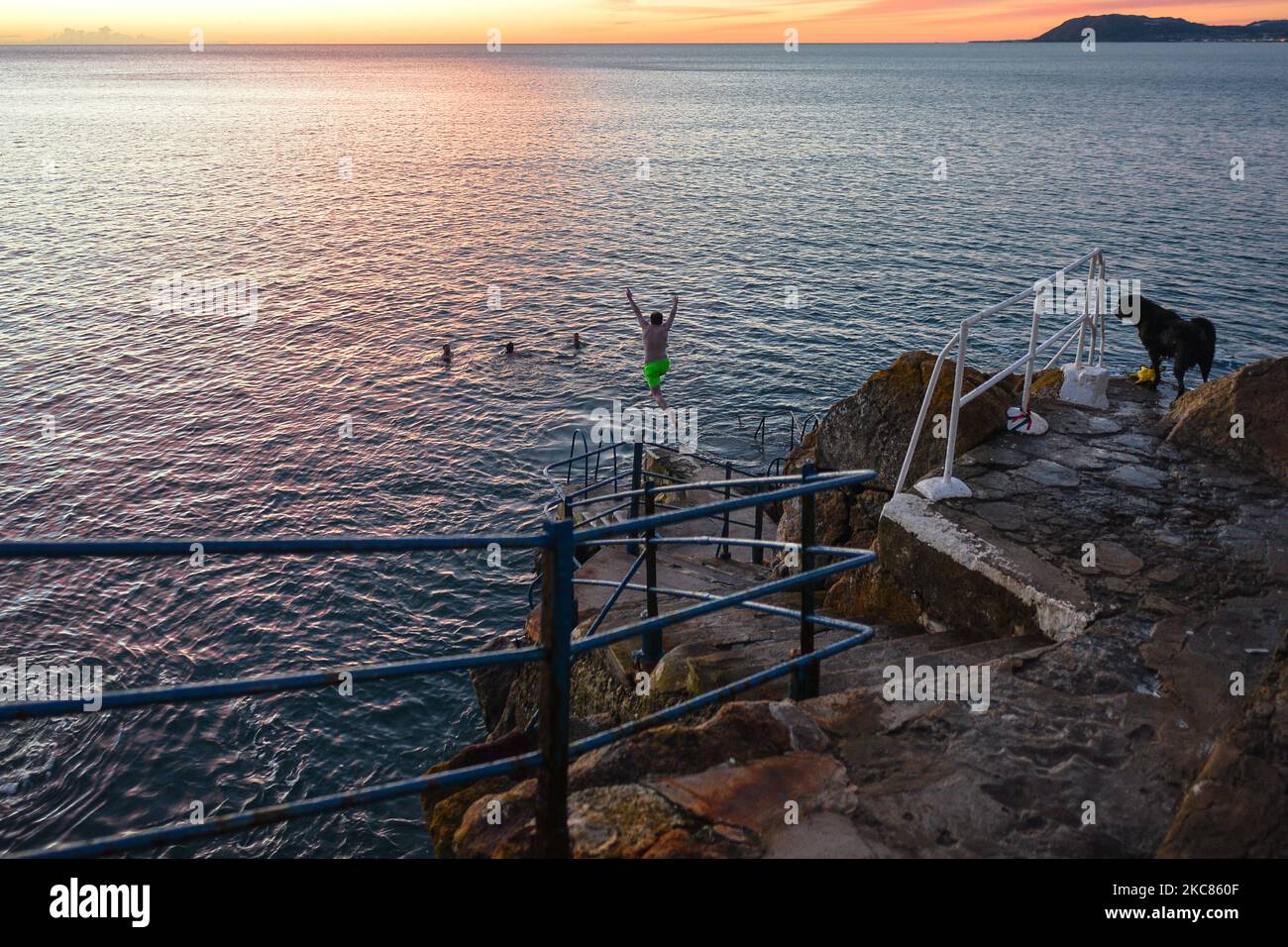 Early morning swimmers at the Vico bathing place, Hawk Cliff, in Dalkey ...