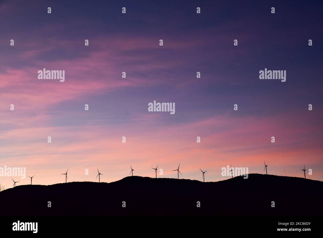 Striking photo of ridgeline wind turbines hi-res stock photography and ...