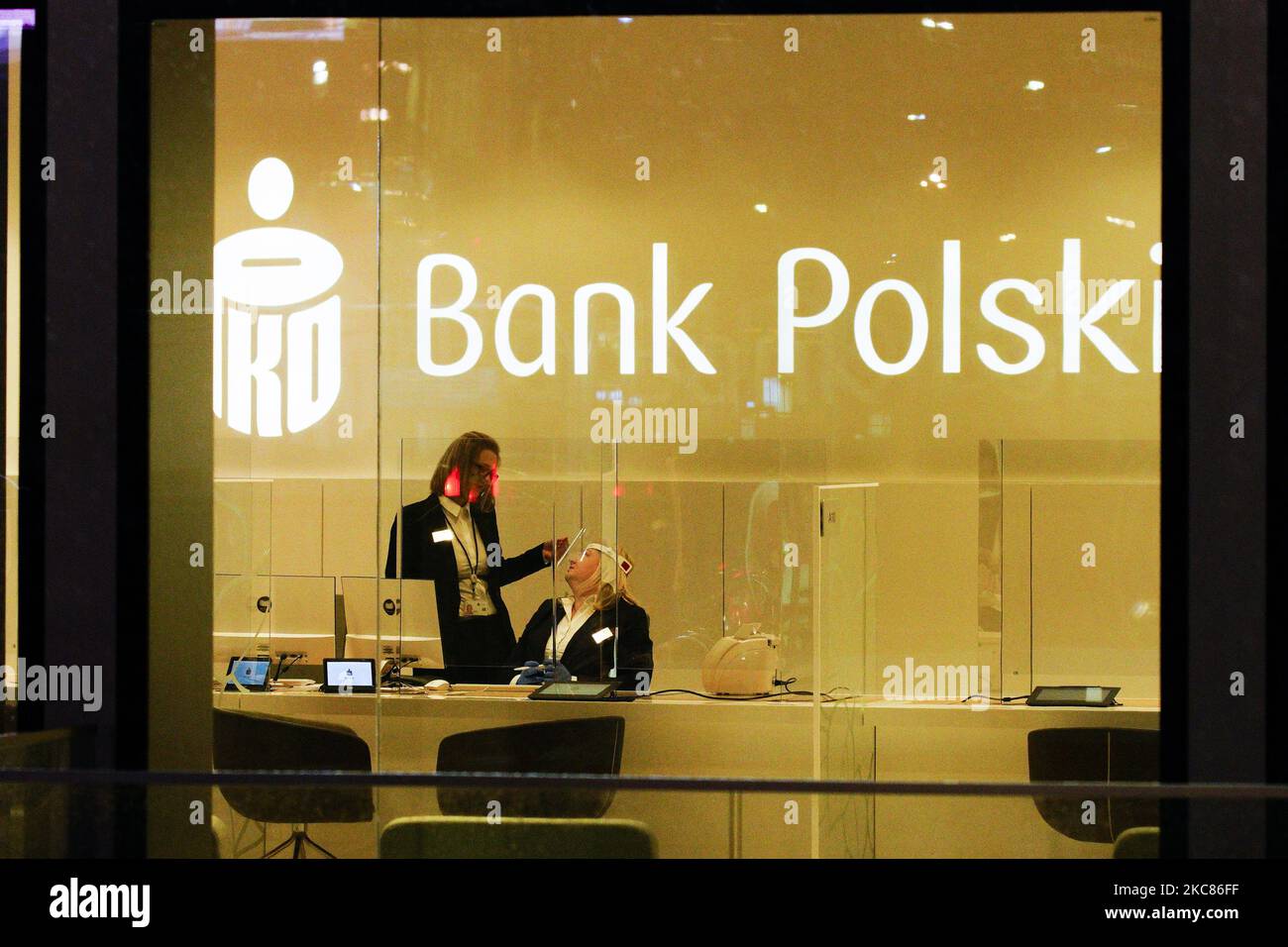 The logo of the national PKO Bank Polski is seen in one of it's ...