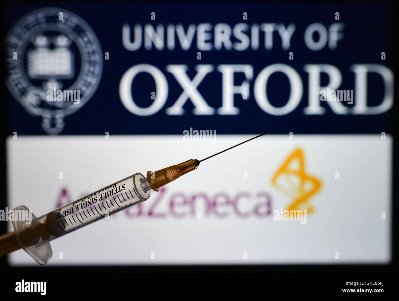 An illustrative image of medical syringes in front of an AstraZeneca ...