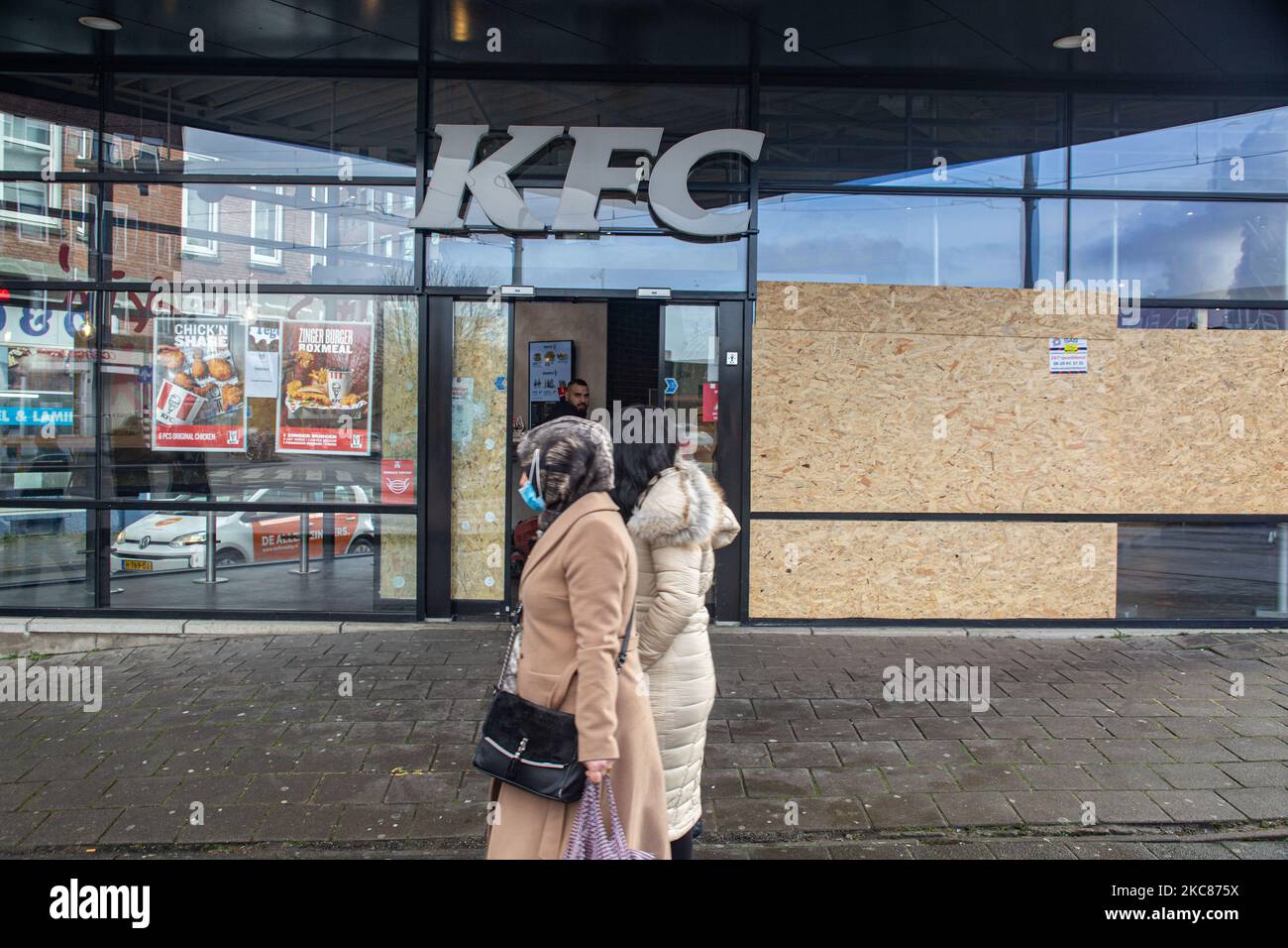 Damaged by the riots KFC fast food chain. The aftermath of the anti ...