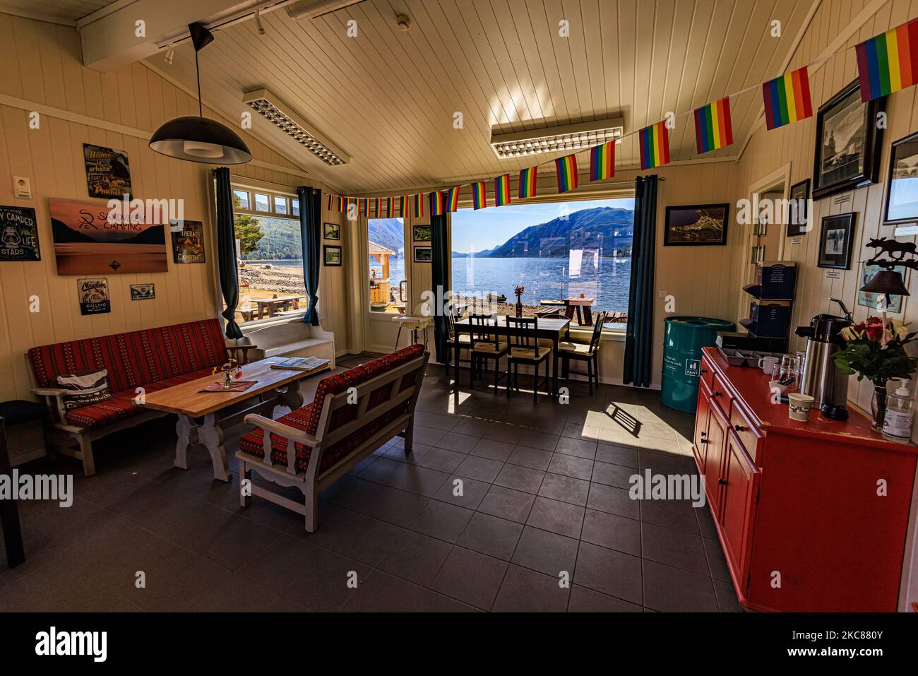 A beautiful small cafe in Sandviken Camping with a lake and mountains ...