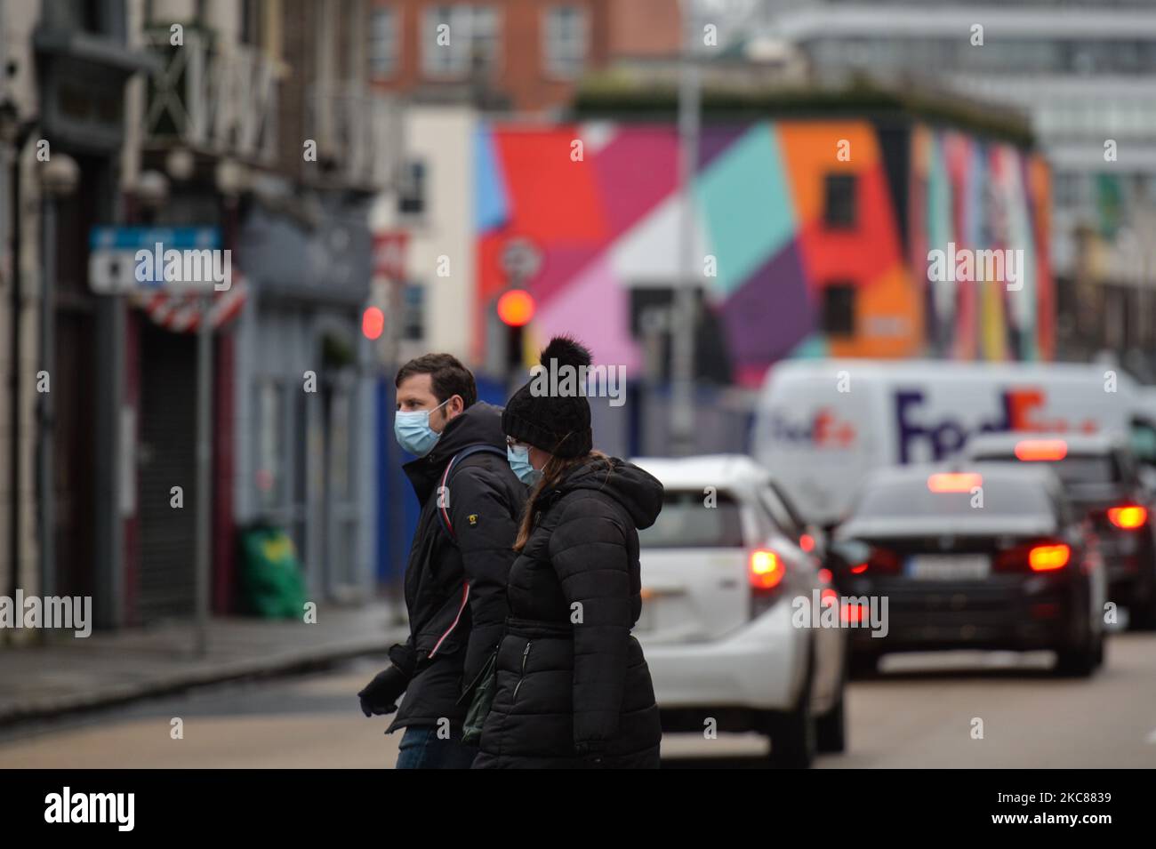 People wearing face masks seen walking in Dublin city center during ...