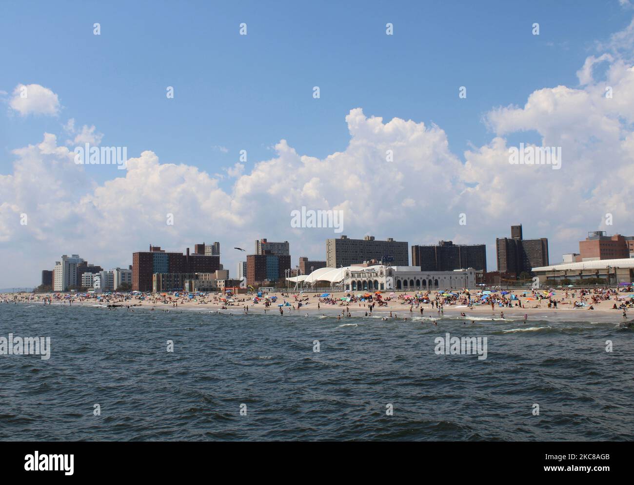 The crowded Coney Island Beach on a sunny day in New York, US Stock ...
