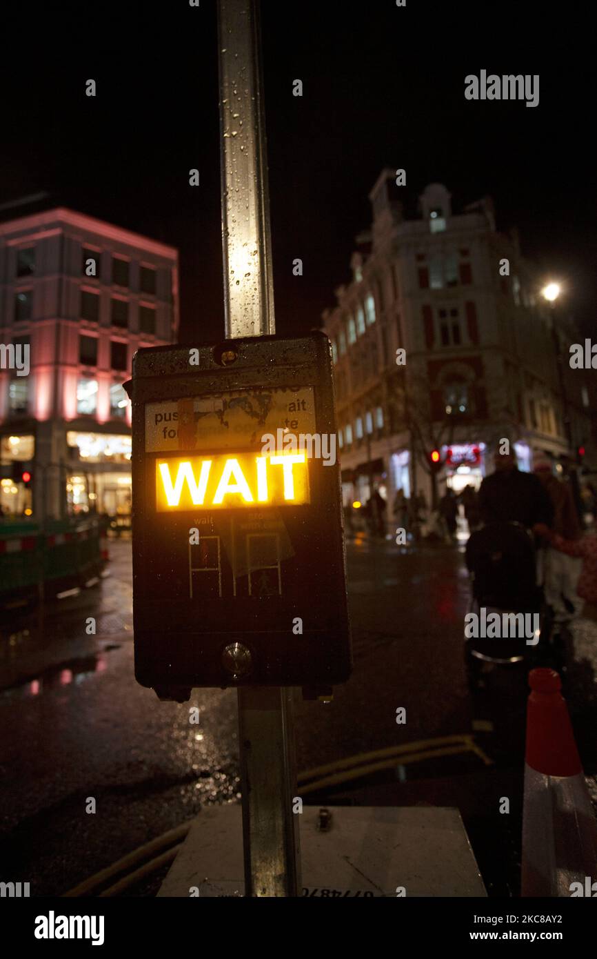 Pedestrian crossing wait sign. London England Stock Photo - Alamy
