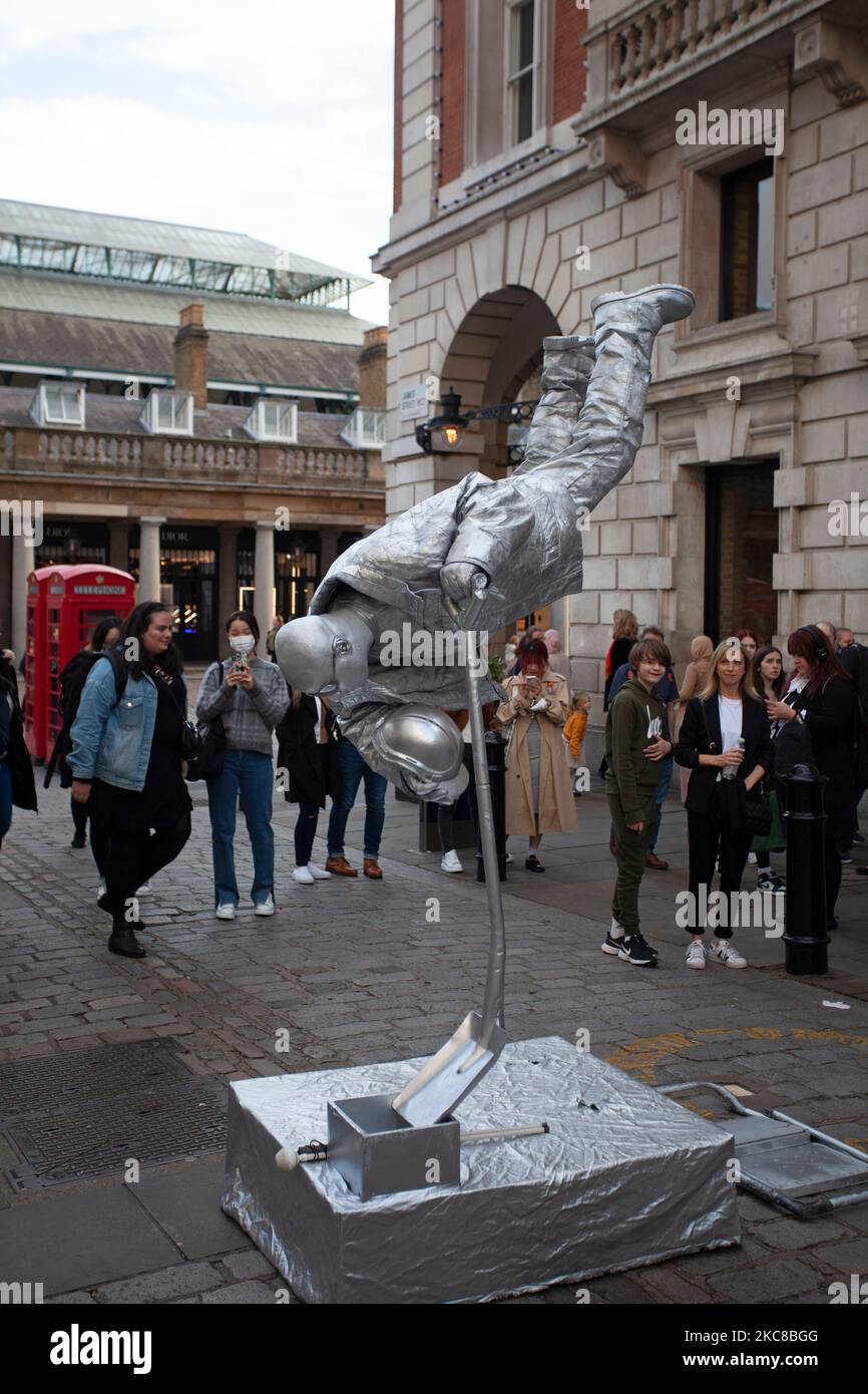 Silver street entertainer in Covent Garden, London England Stock Photo ...