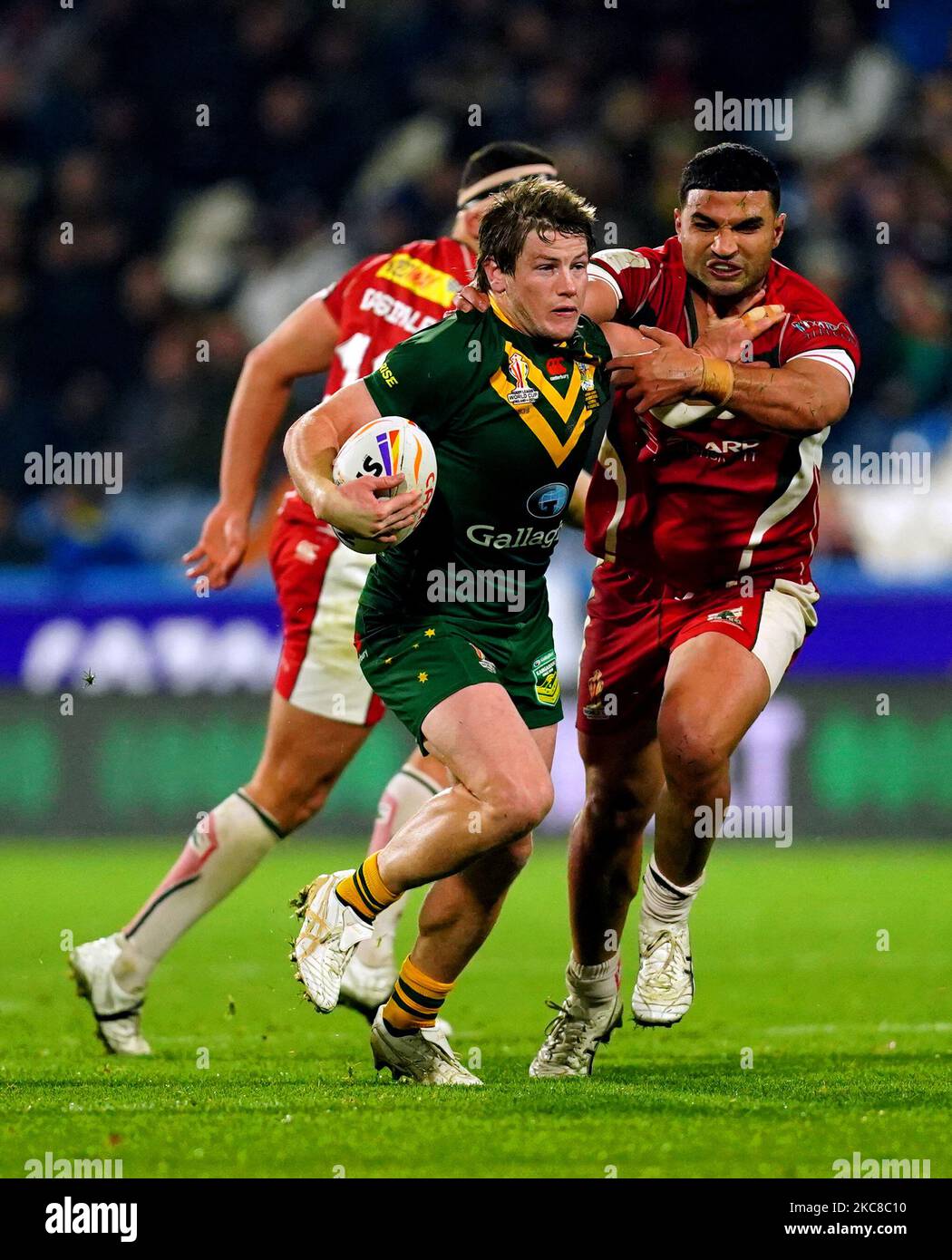 Australia's Harry Grant (left) holds off Lebanon's Elie El-Zakhem ...