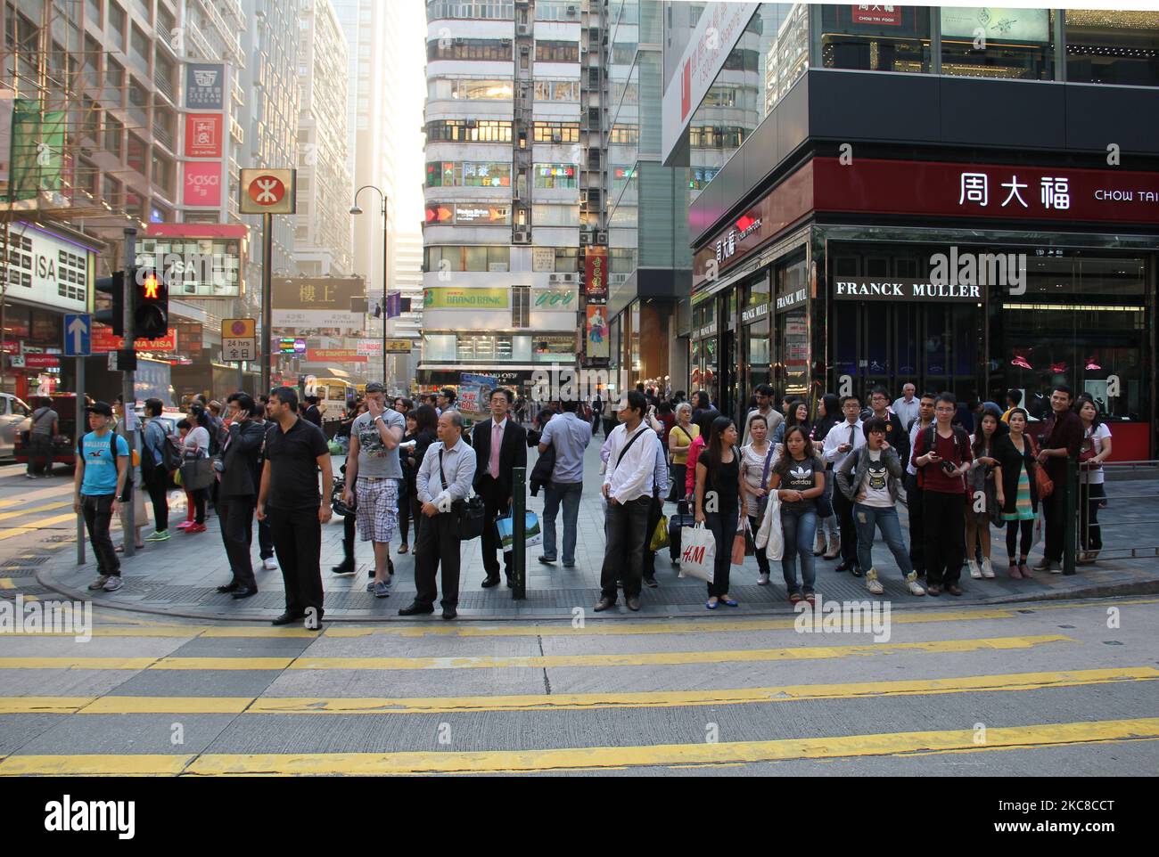Waiting for a green light to cross the street hi-res stock photography ...