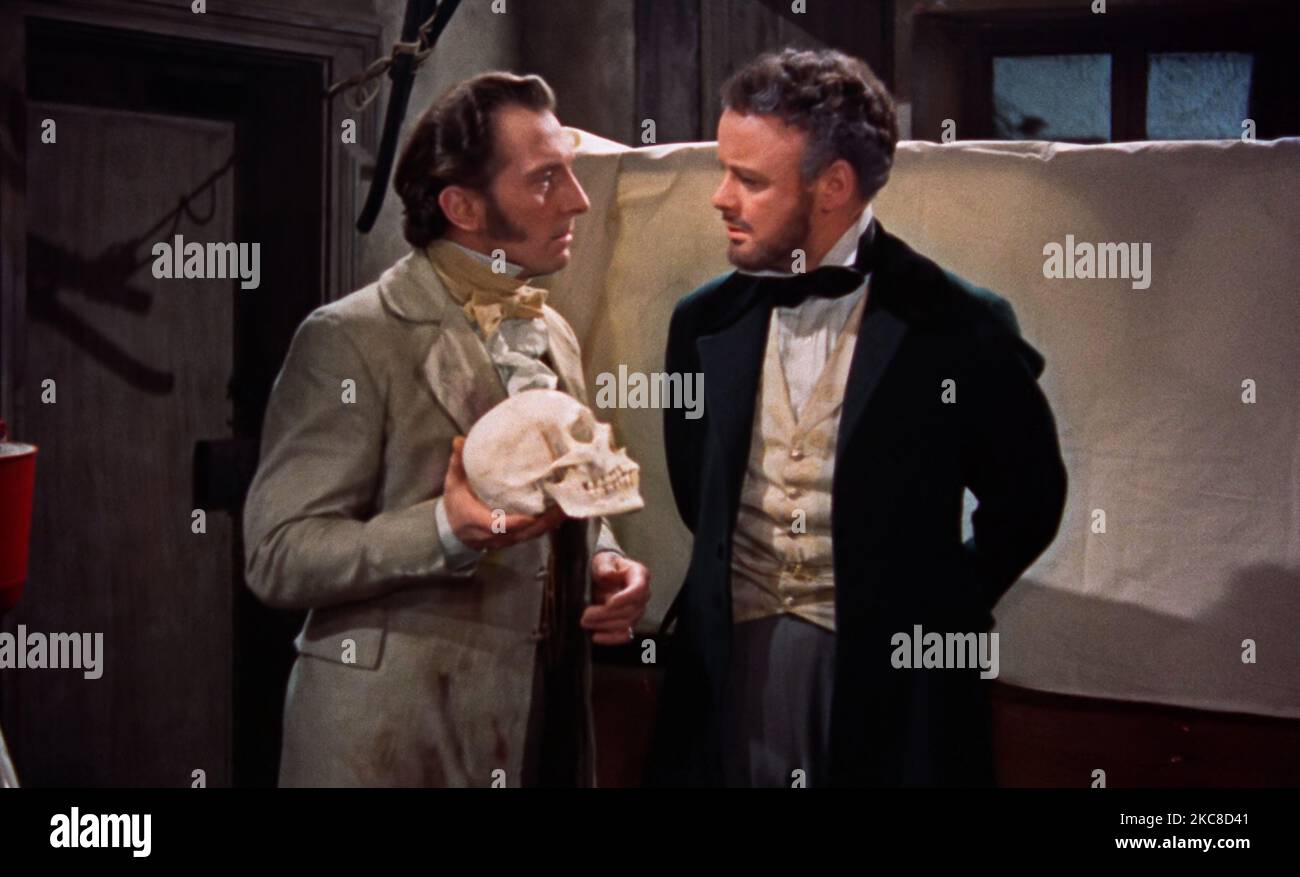 USA . Peter Cushing and Robert Urquhart in a scene from the (C)Warner ...