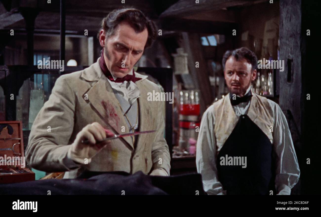 USA . Peter Cushing and Robert Urquhart in a scene from the (C)Warner Bros. film: The Curse of ...
