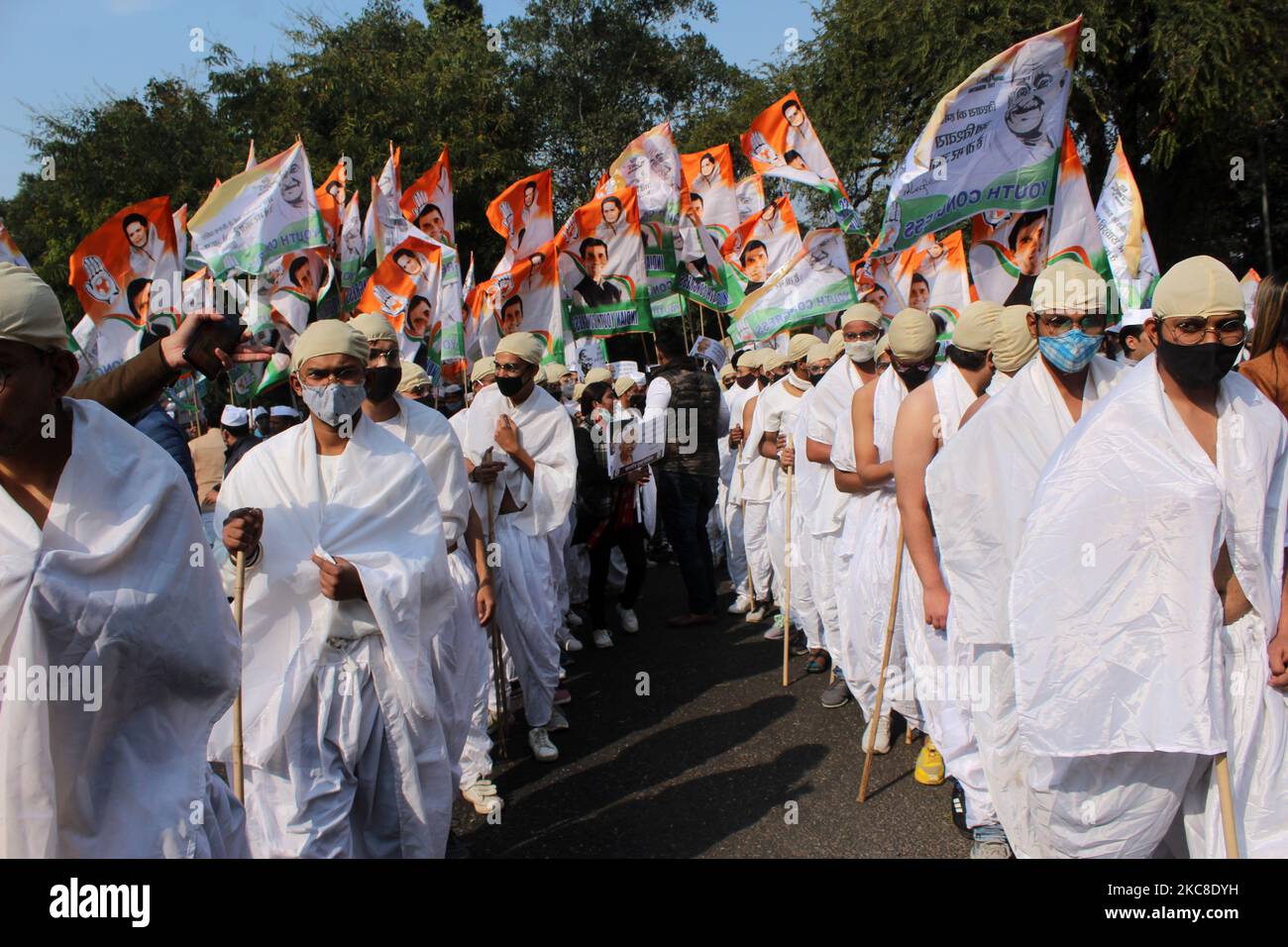 Indian Youth Congress (IYC) activists dressed as Mahatma Gandhi, taking ...