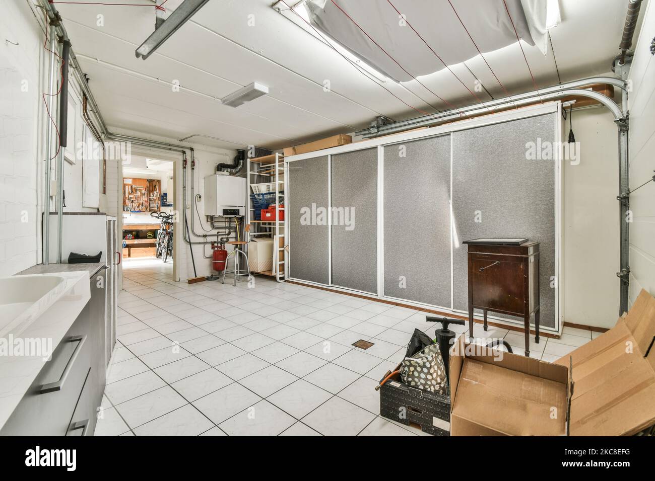 Boiler room of an apartment building with pipes and metering devices. A ...