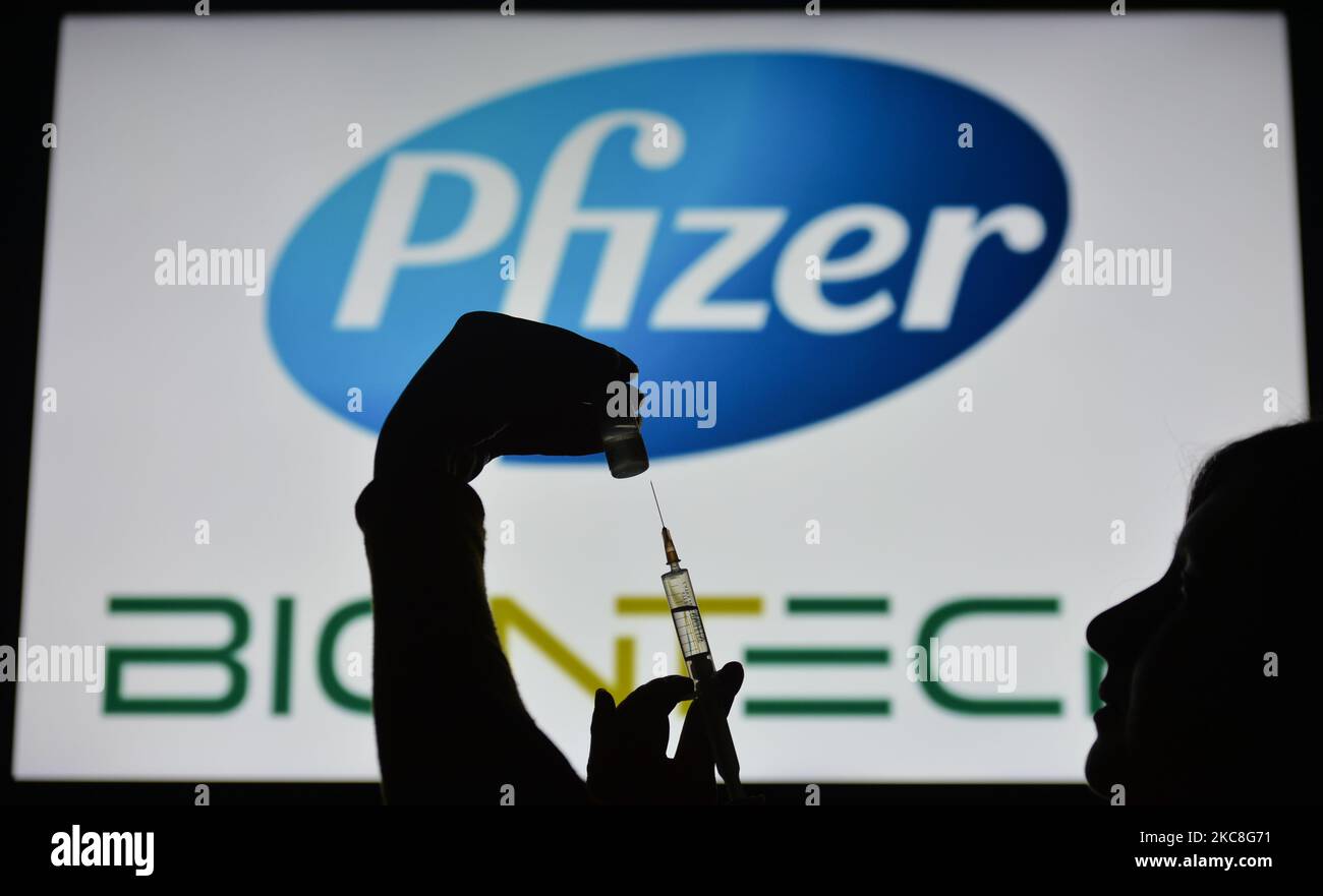 An illustrative image of a person holding a medical syringe and vale in ...