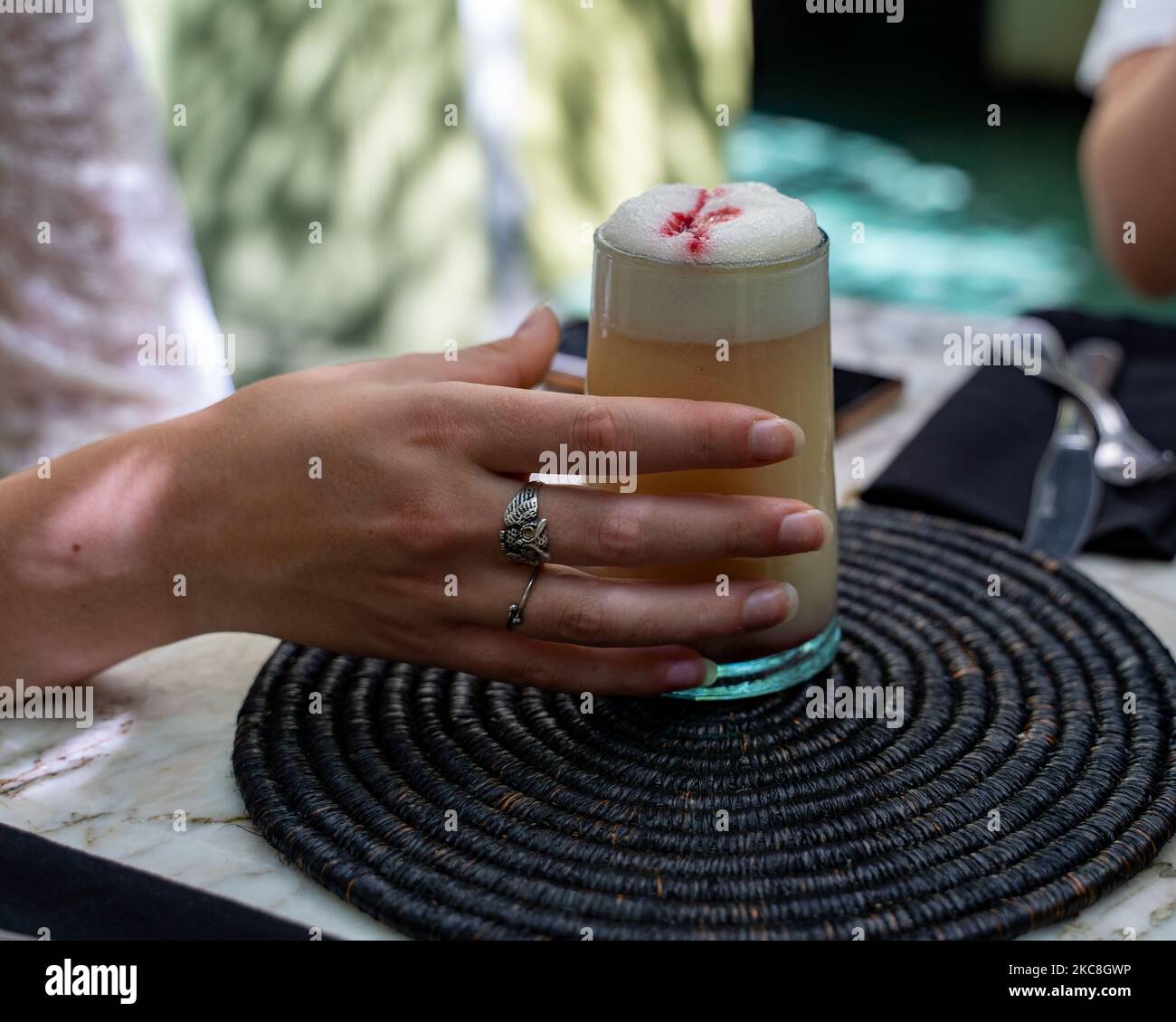 Hand grabbing a glass hi-res stock photography and images - Alamy