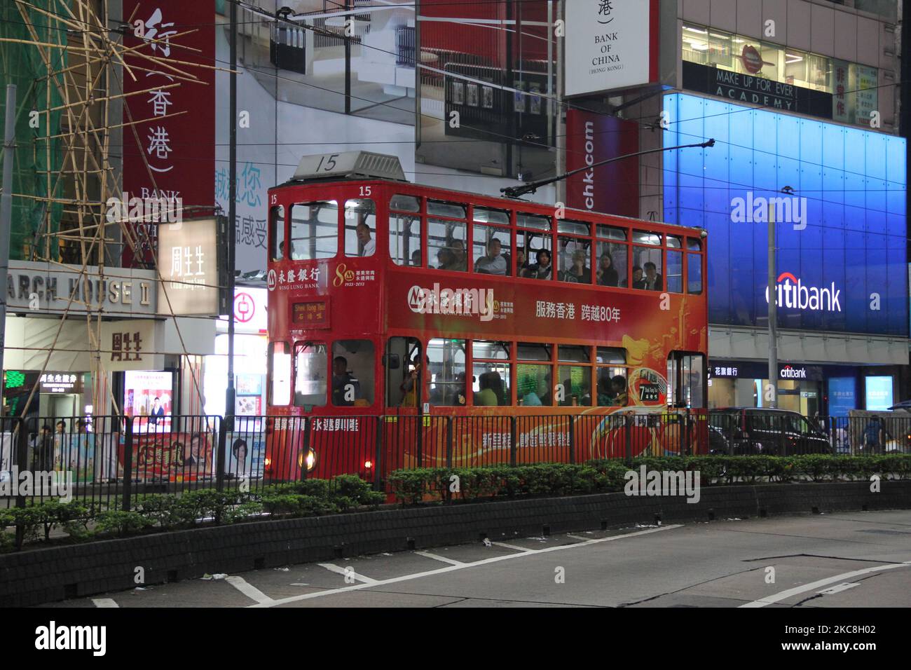 A red double-decker bus Ding Ding on a road in downtown Hong Kong Stock ...